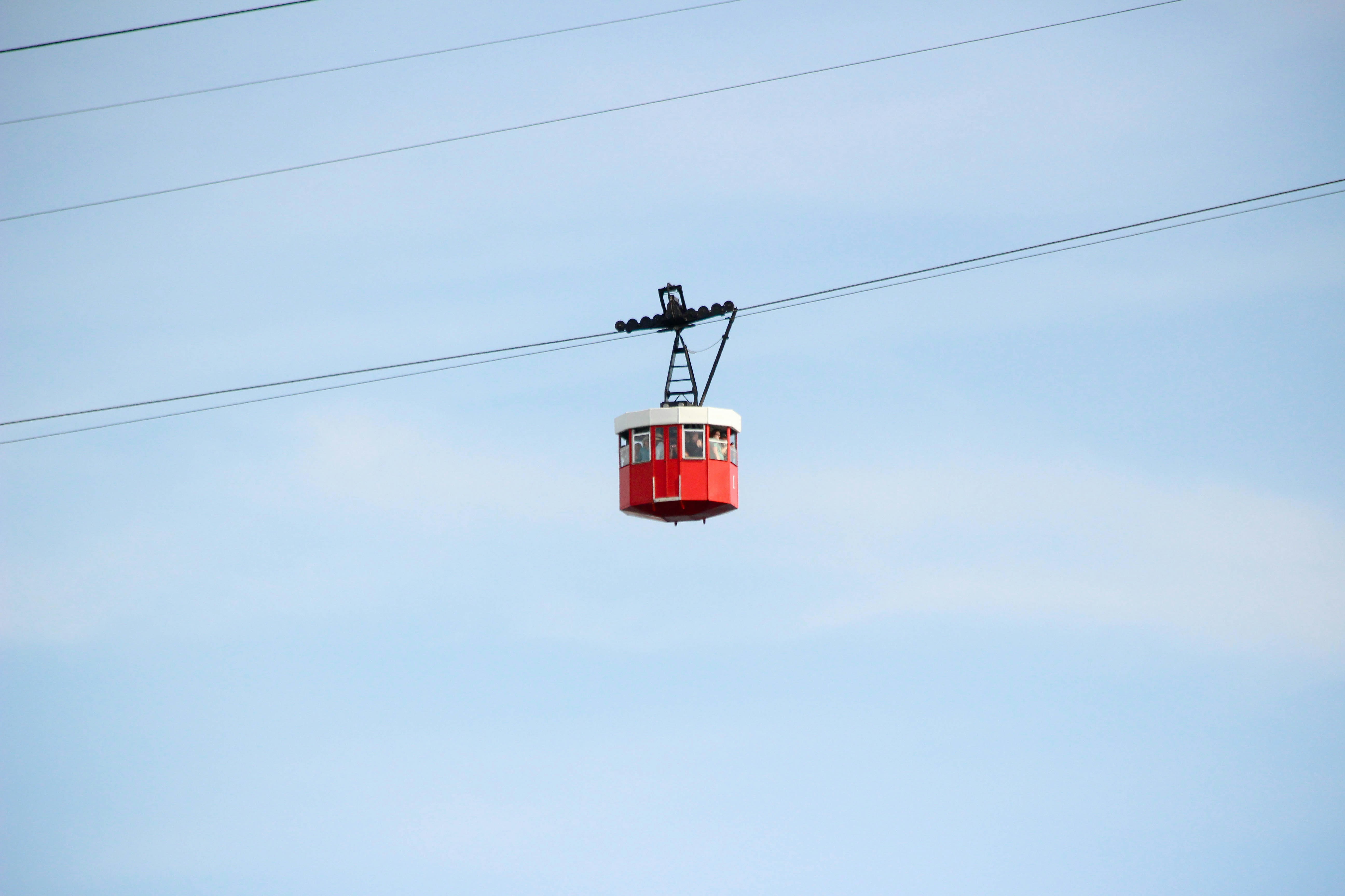 Red and white cable car during daytime photo – Free Cable car Image on ...