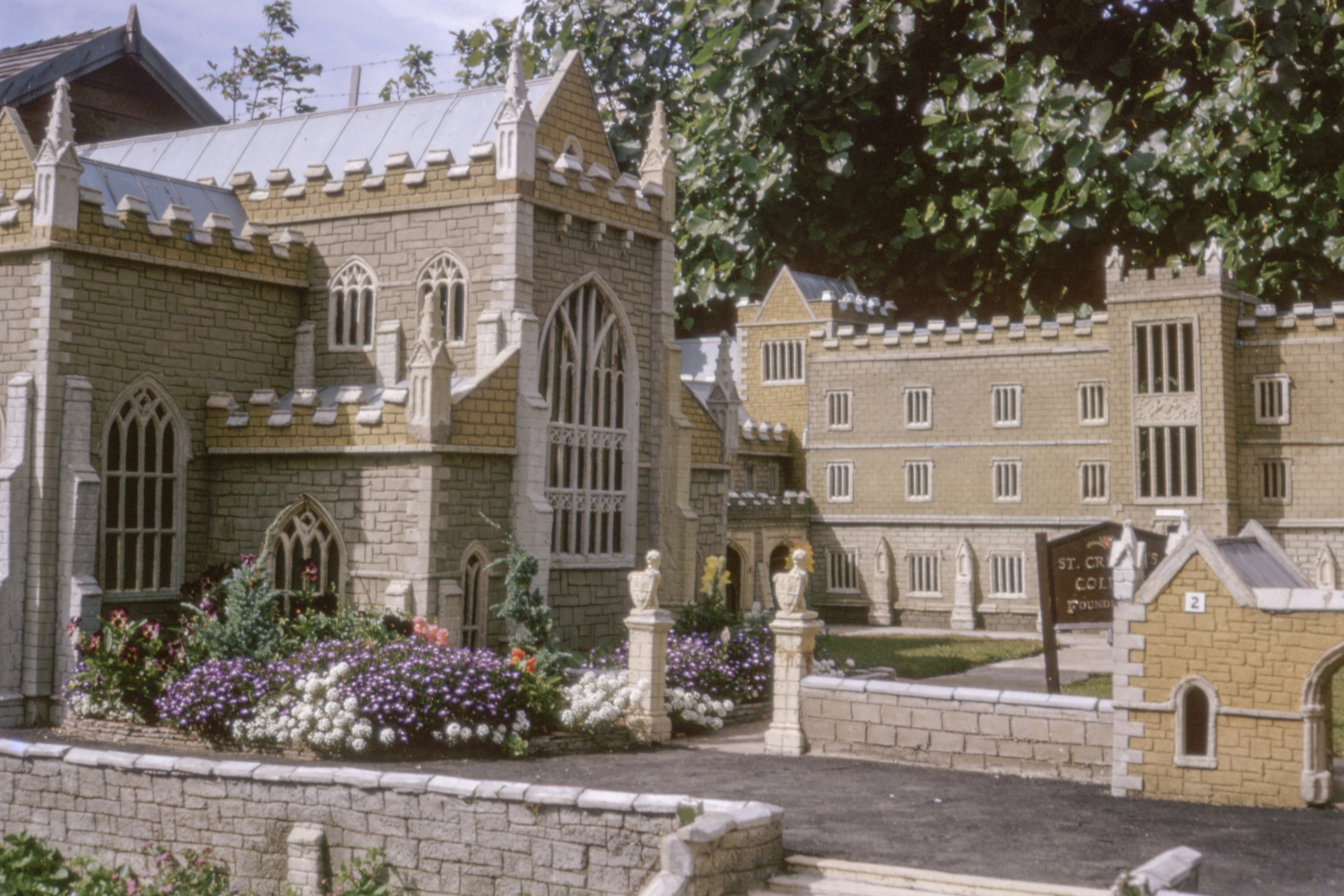 Miniature Gothic Village Pathway Under a Canopy of Trees