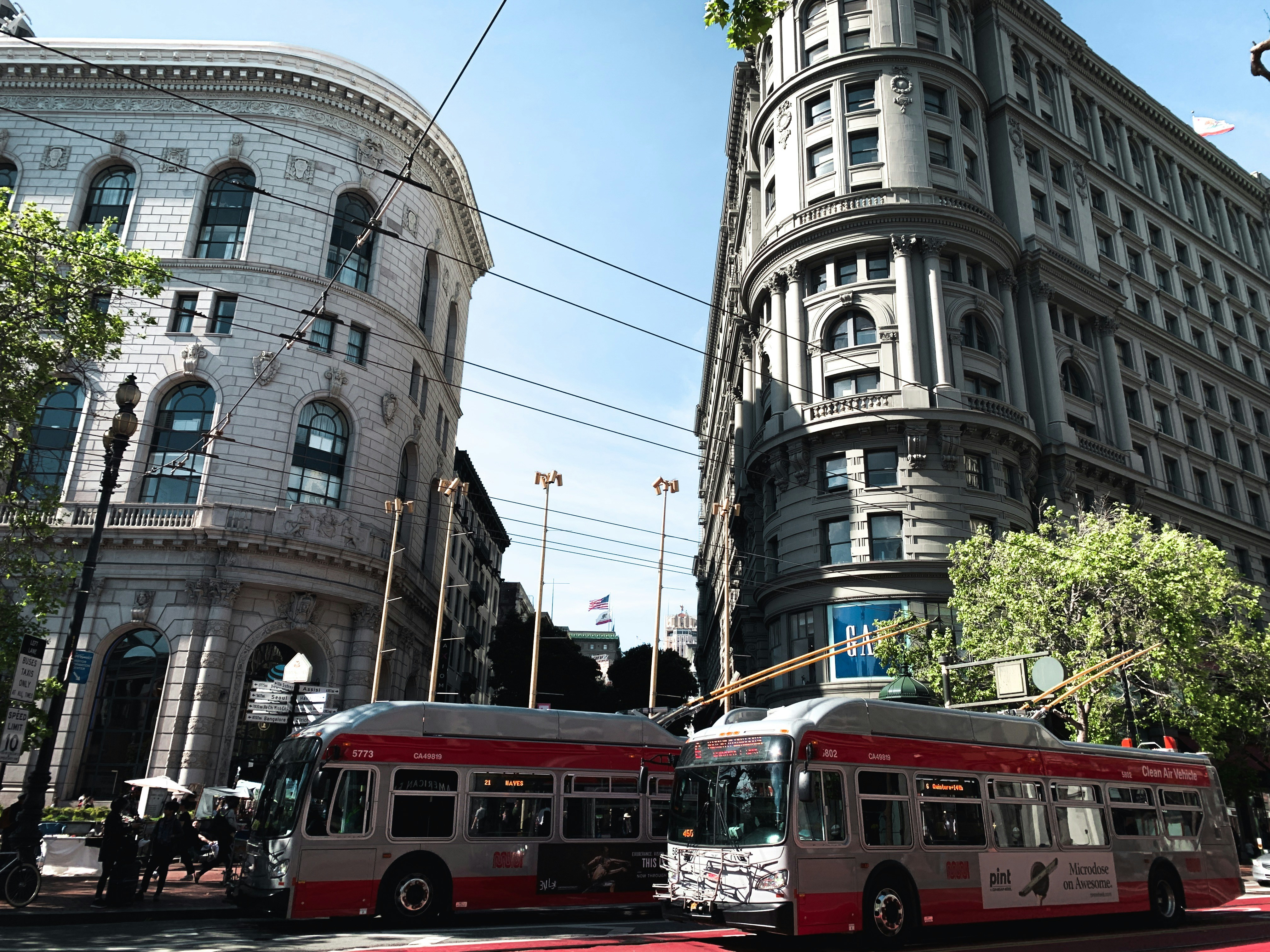 Gray and red transit bus on street photo – Free Blue Image on Unsplash