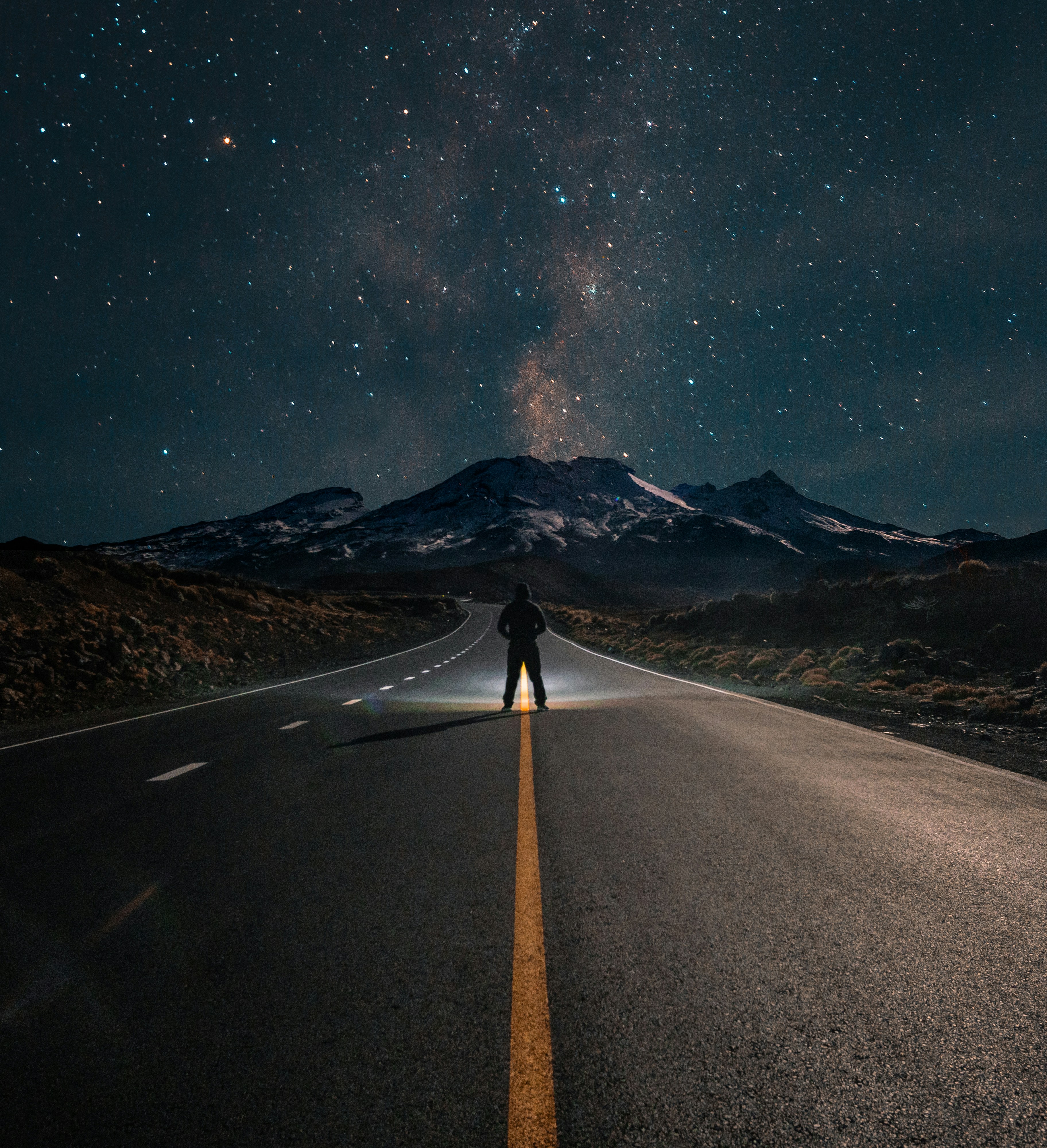 Person standing at road during night time photo – Free Grey Image on ...