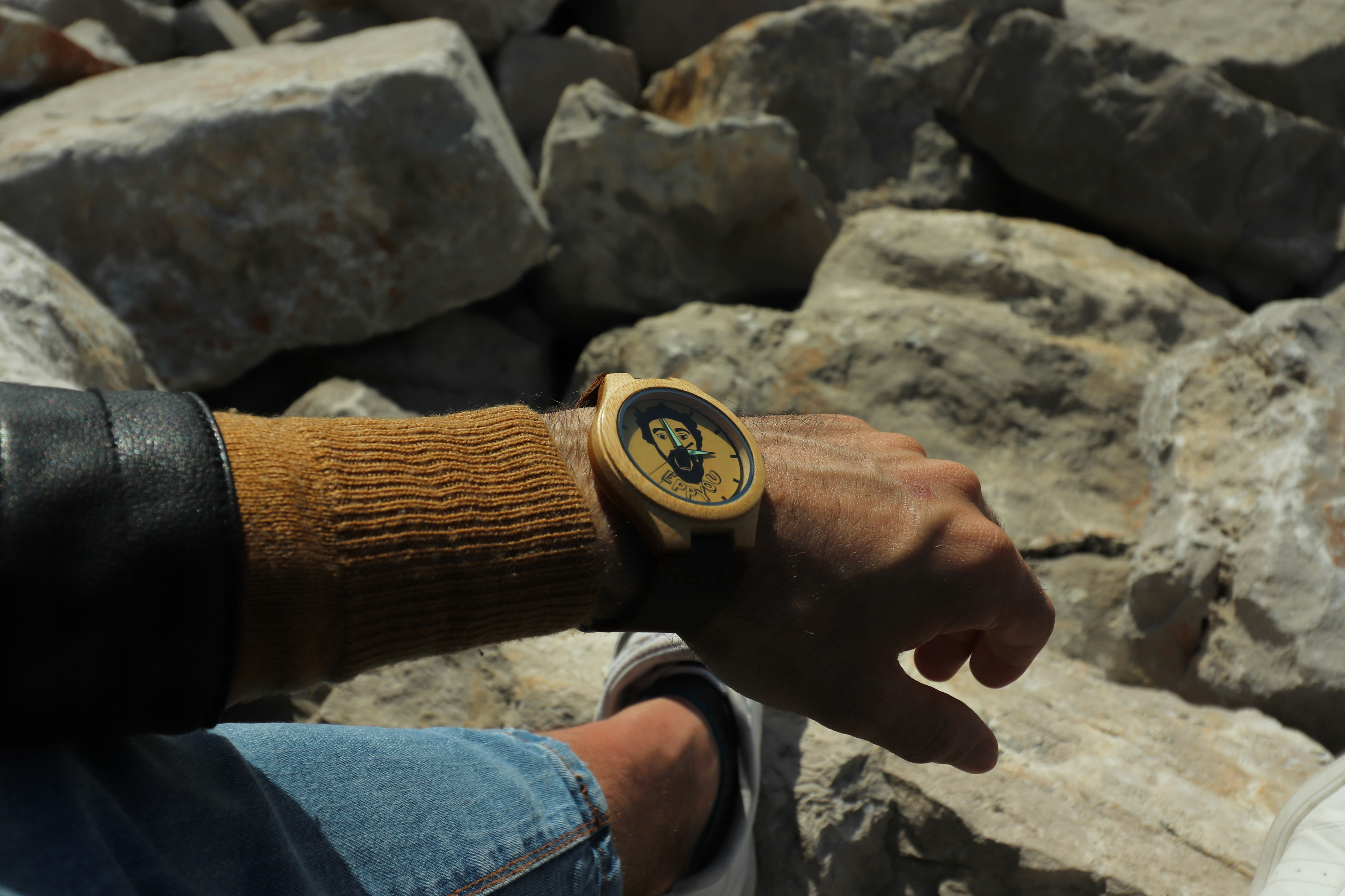 Wristwatch Overlooking Stone Terrain: A Moment of Quiet Gear Nearby