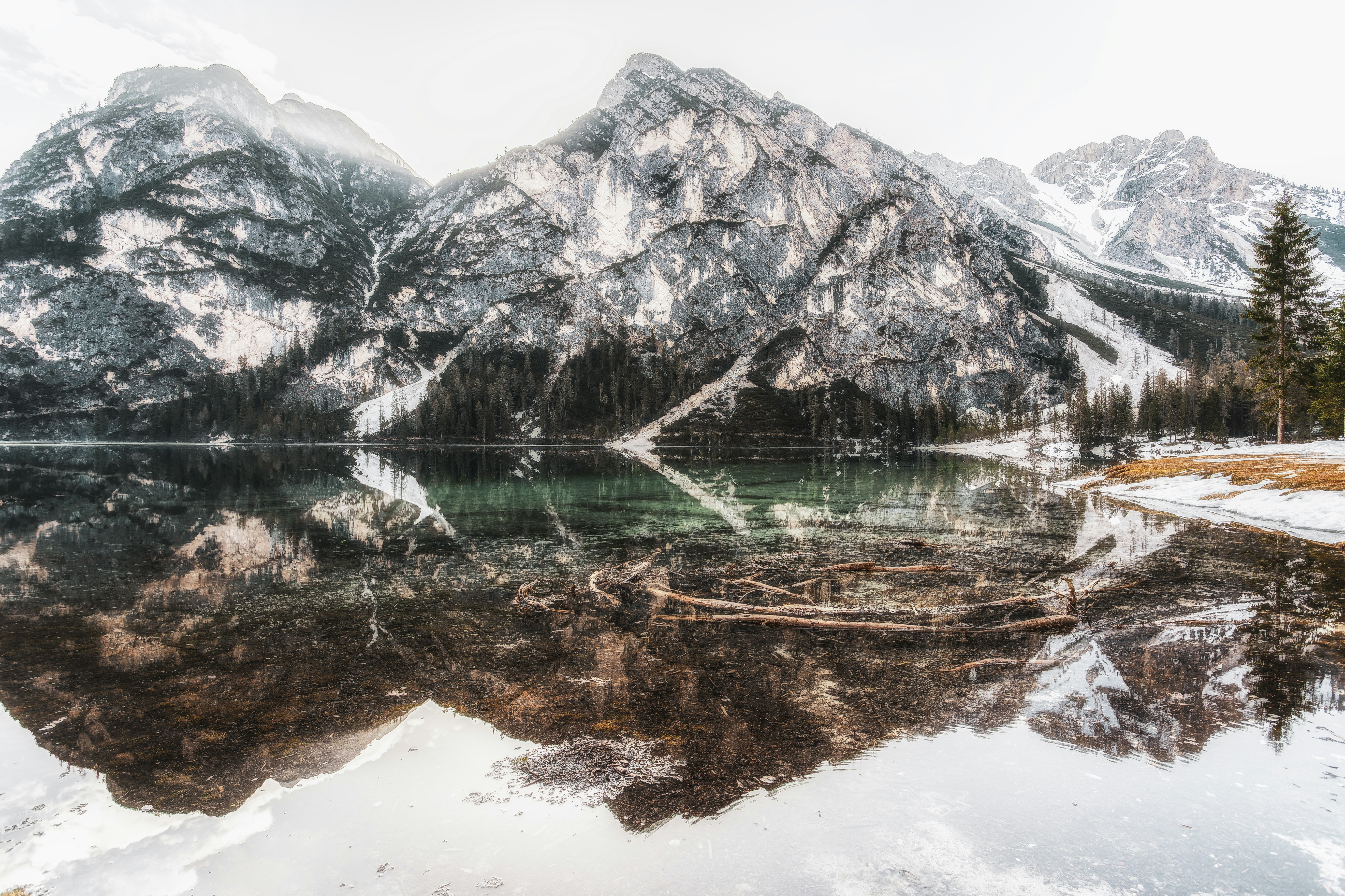 Ice cap mountain near body of water photo – Free Grey Image on Unsplash