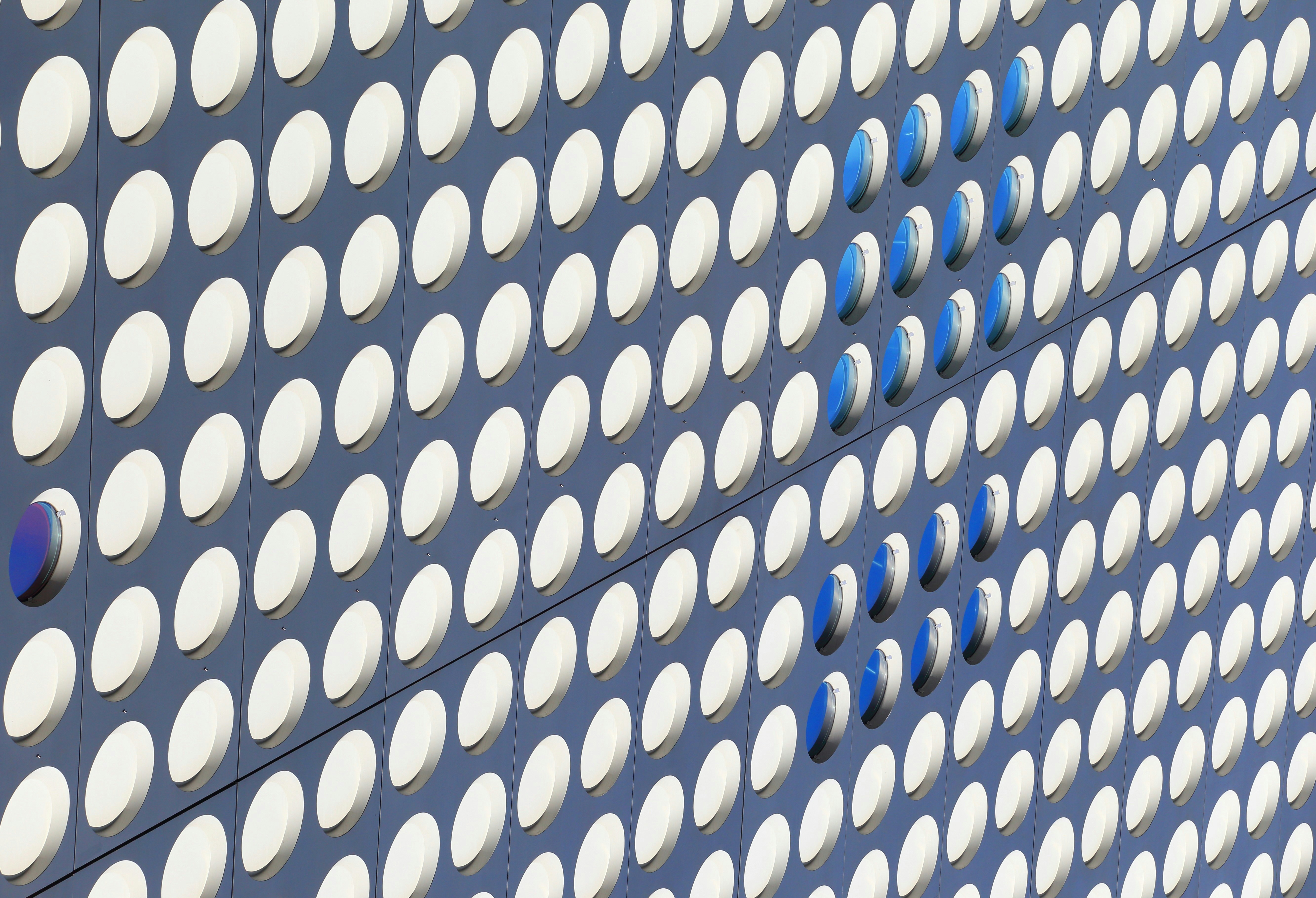 Gray panel with holes photo – Free Utrecht Image on Unsplash