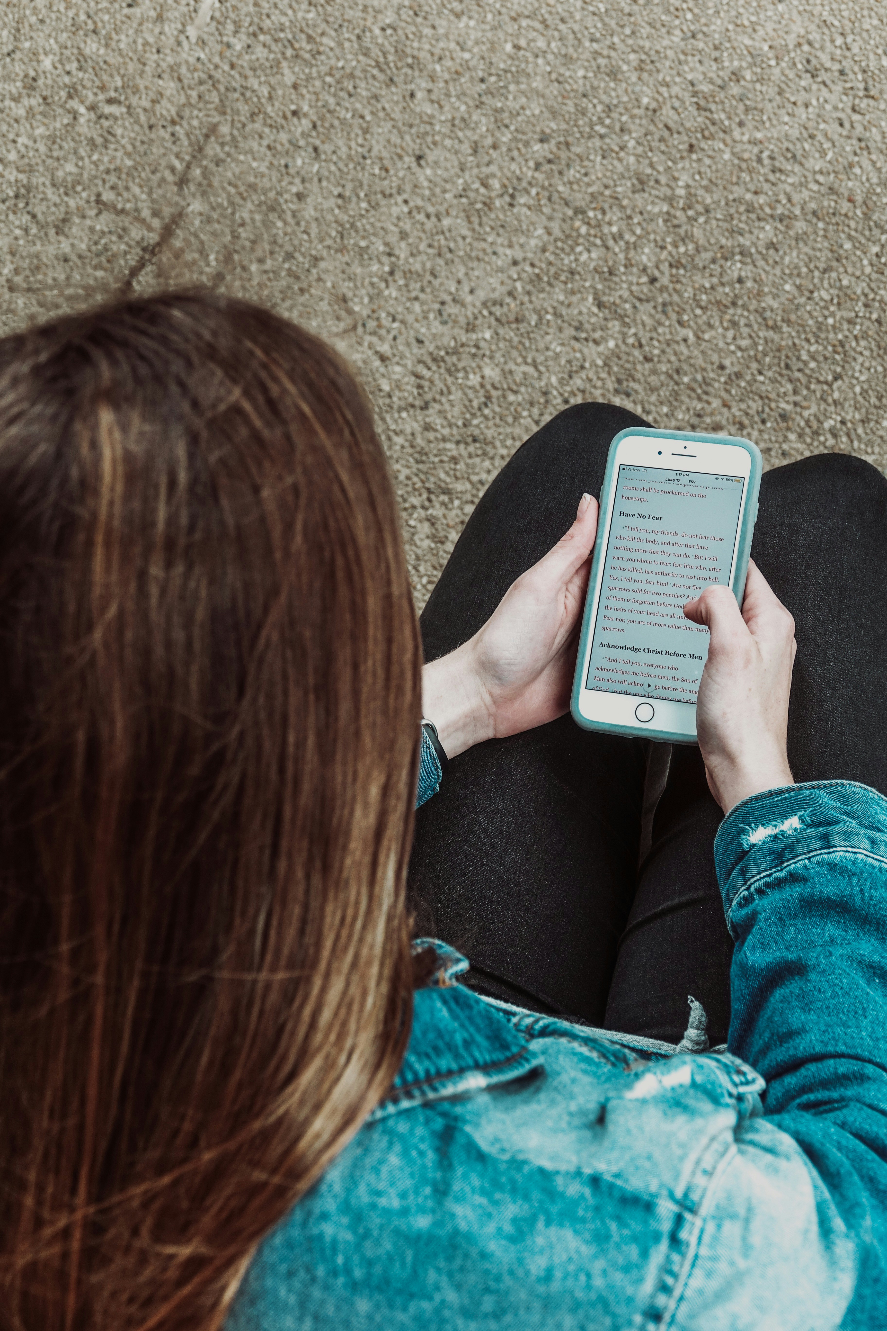 Holding the Screen: A Quiet Moment with a Phone in Hand