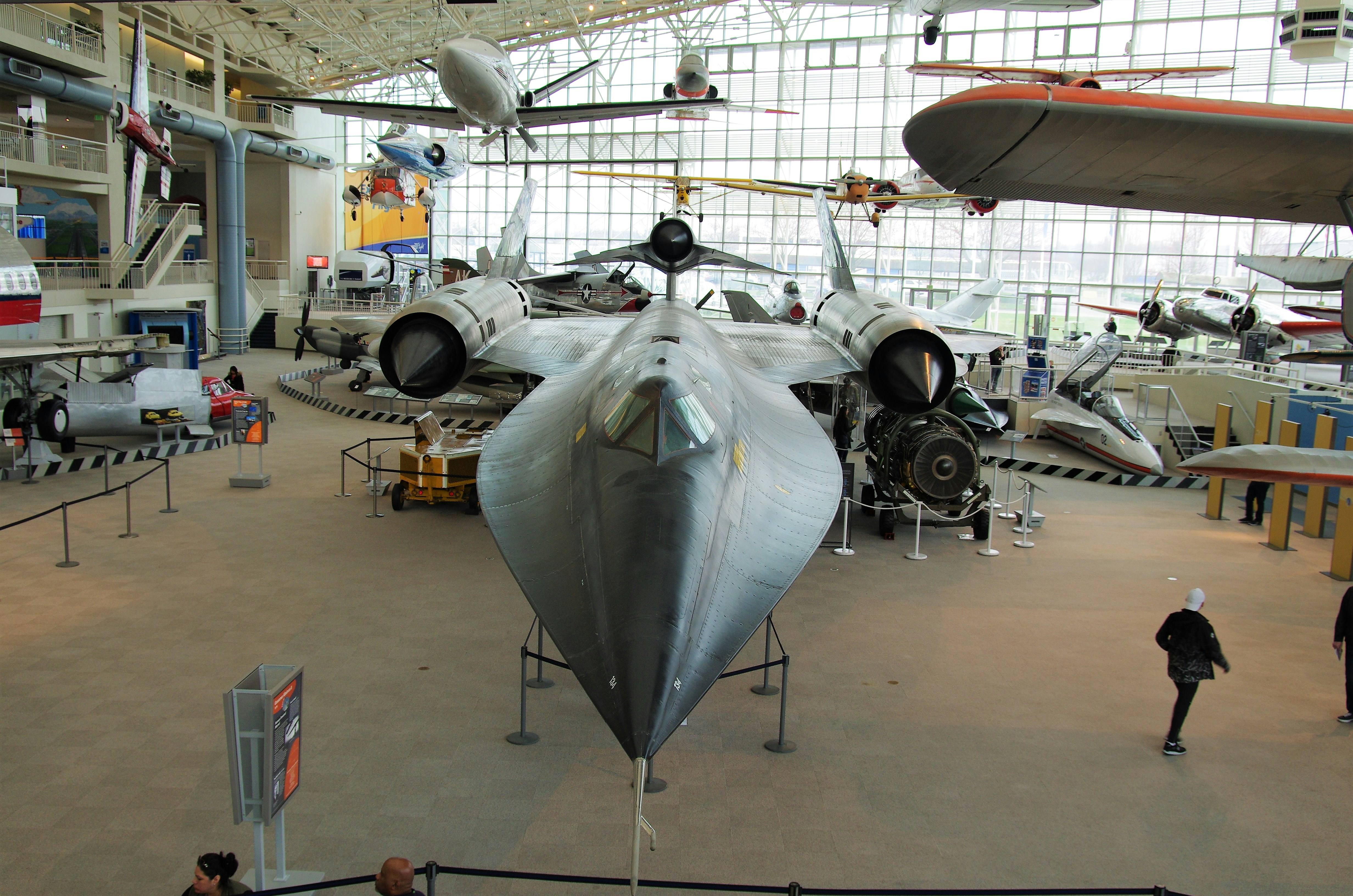 Centerline Sentinel: The Museum Jet's Dominant Nose in a Sunlit Hangar