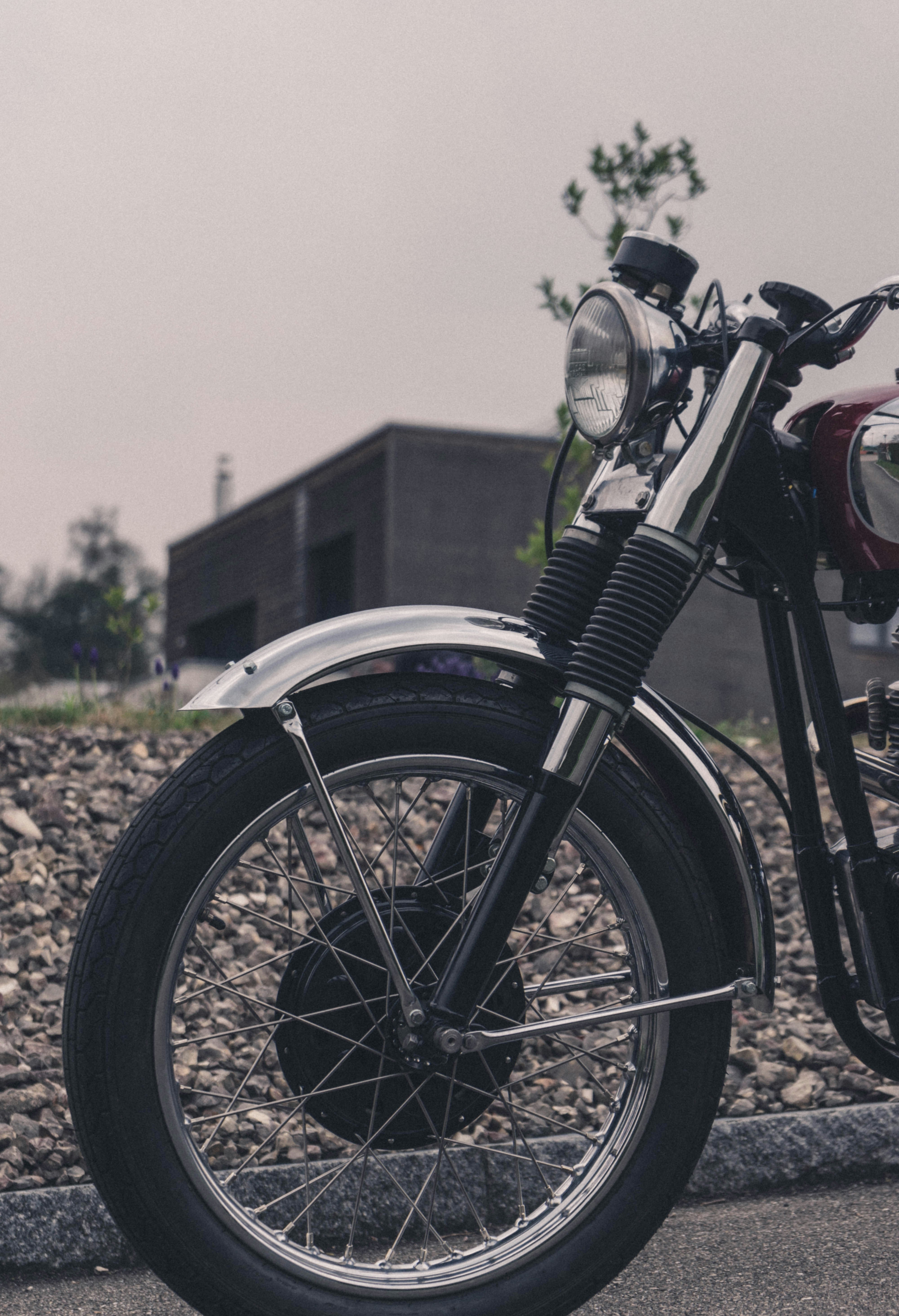 Parked black motorcycle beside curb photo – Free Grey Image on Unsplash