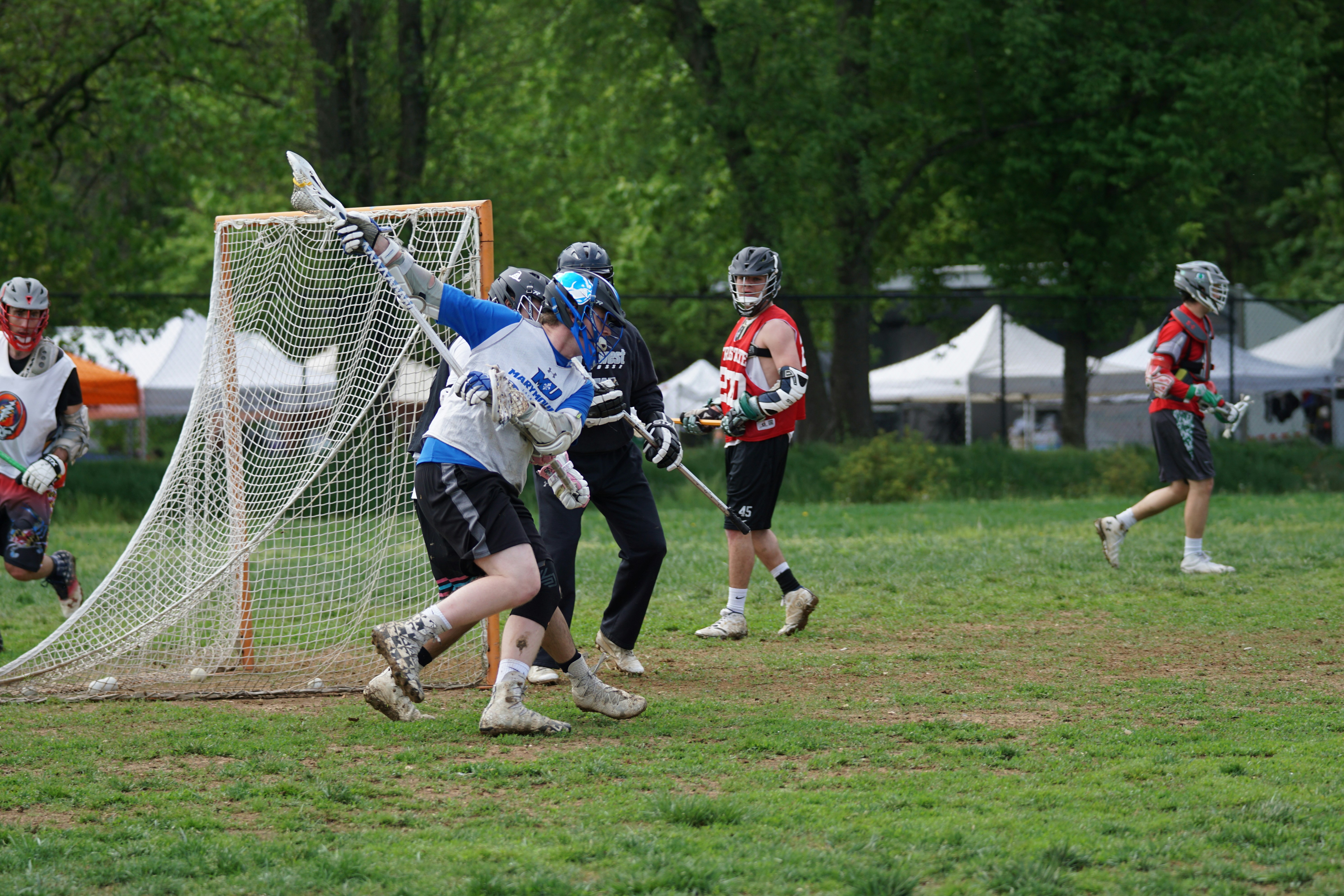 People playing lacrosse during daytime photo – Free Human Image on Unsplash