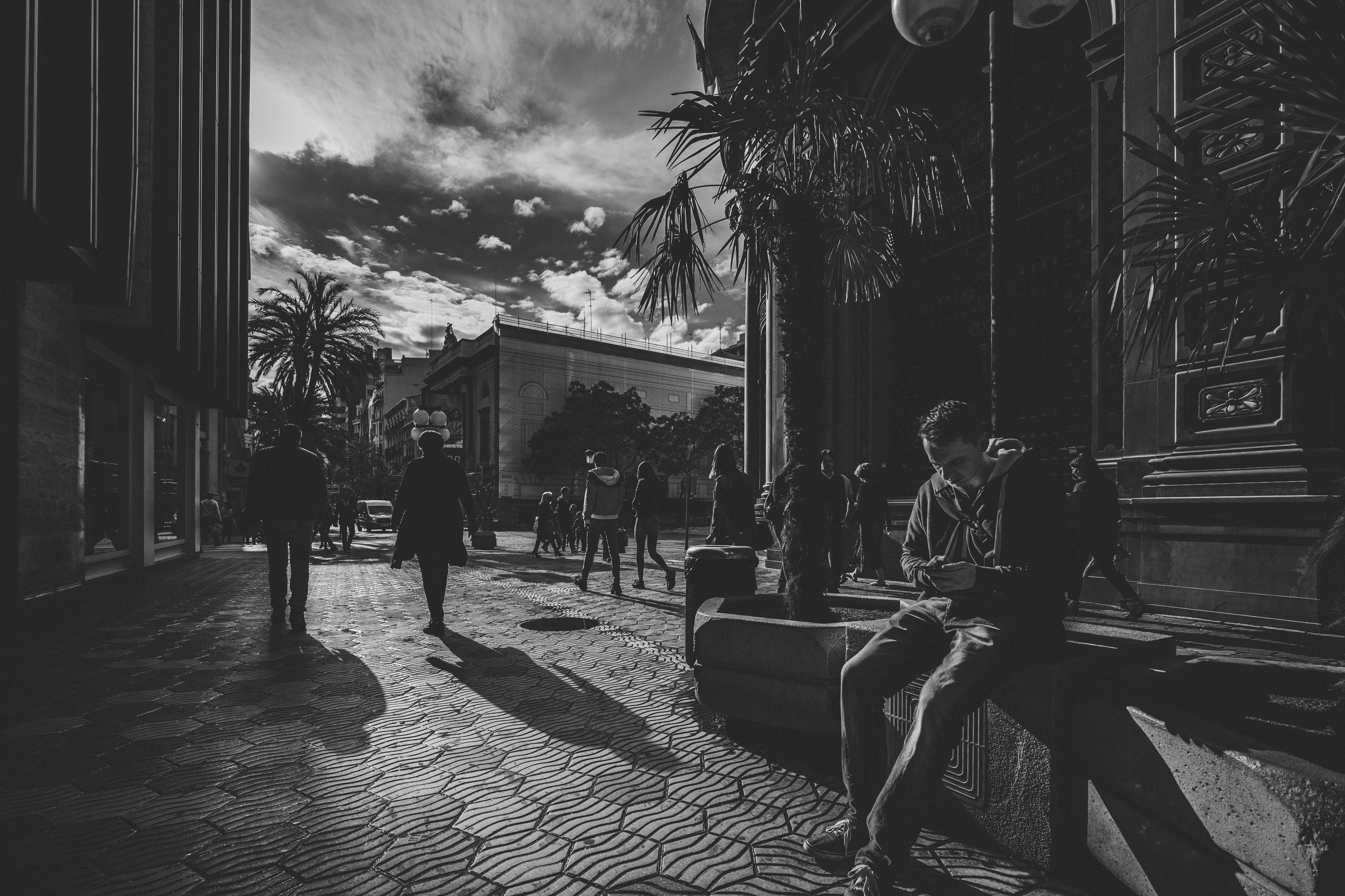 Grayscale photography of people beside buildings photo – Free Person ...