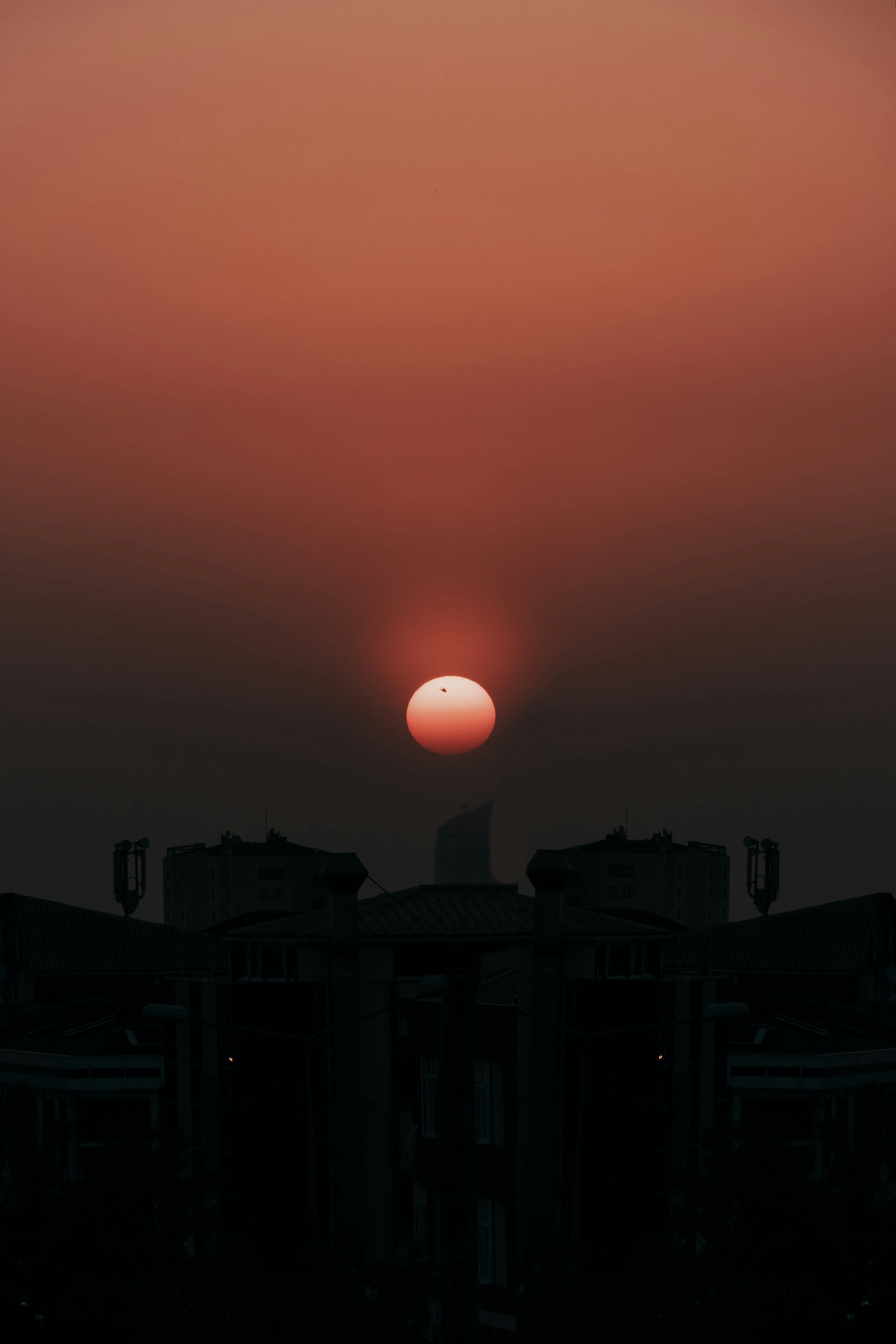 Sunset with chopper. I saw the helicopter and waited for it to fall on the sun. When i felt it I took off my machine and photographed it.