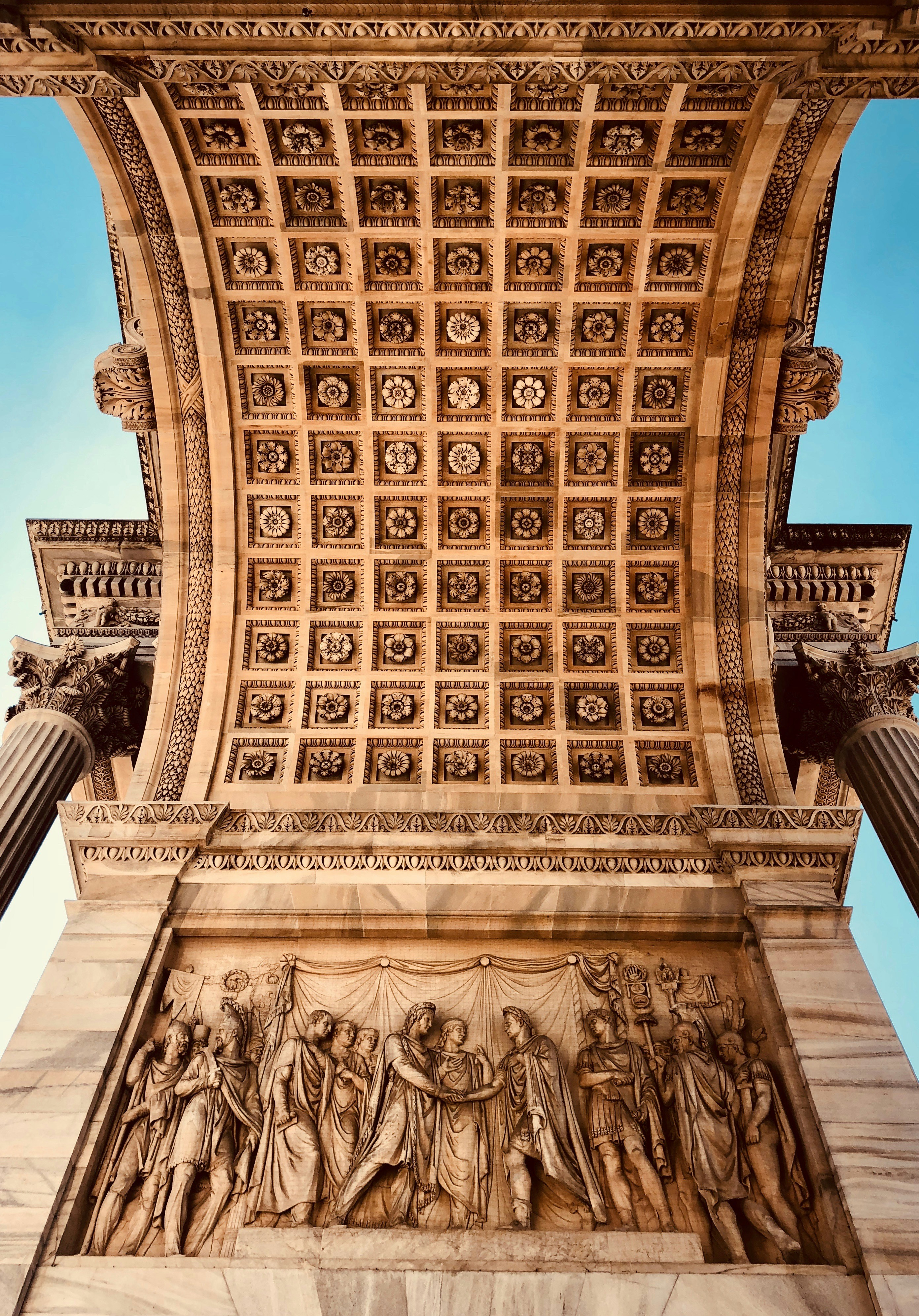 Under the Arch: Coffered Vaults and a Carved Relief