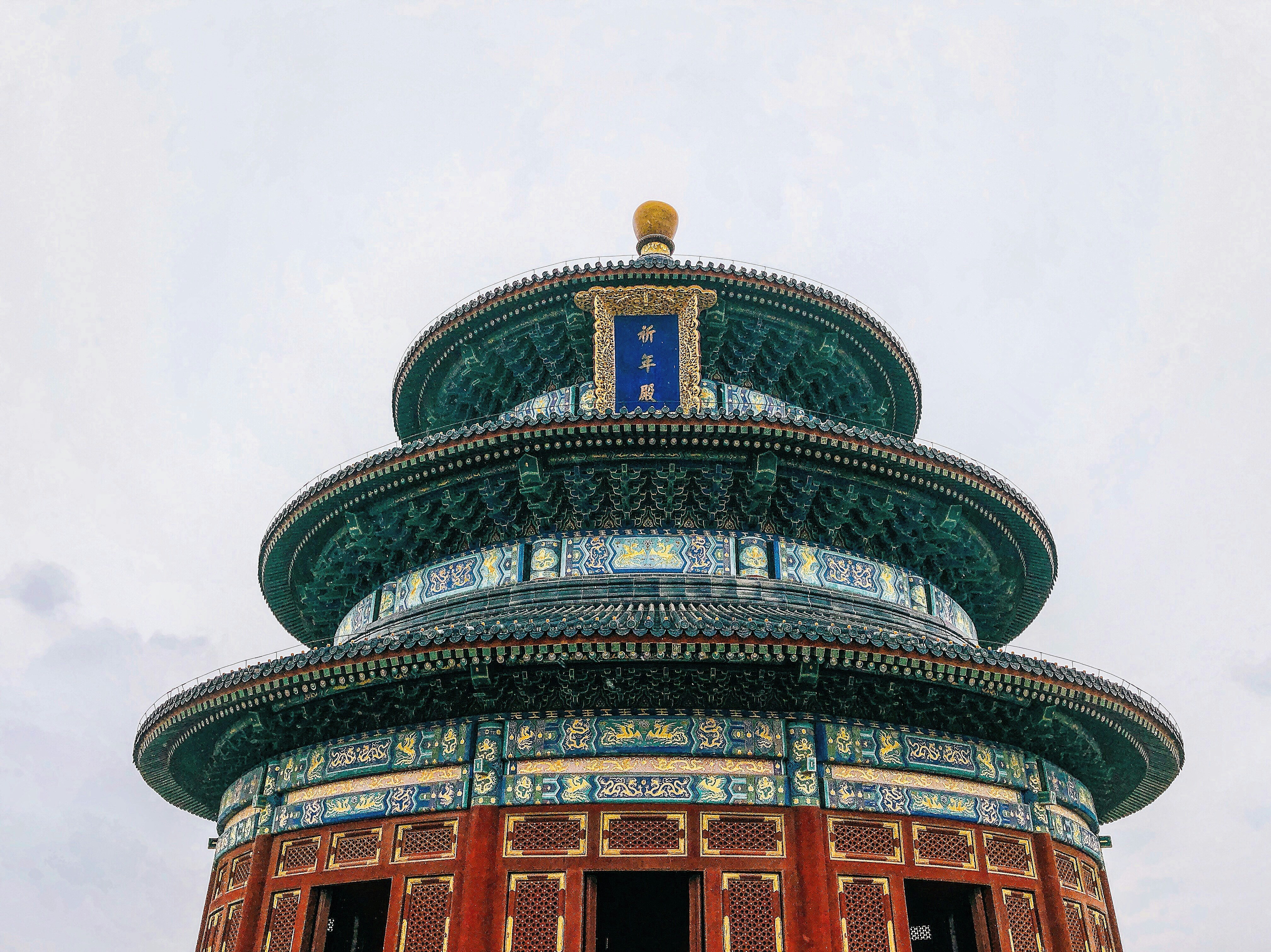 Green and red concrete temple during daytime photo – Free Grey Image on ...