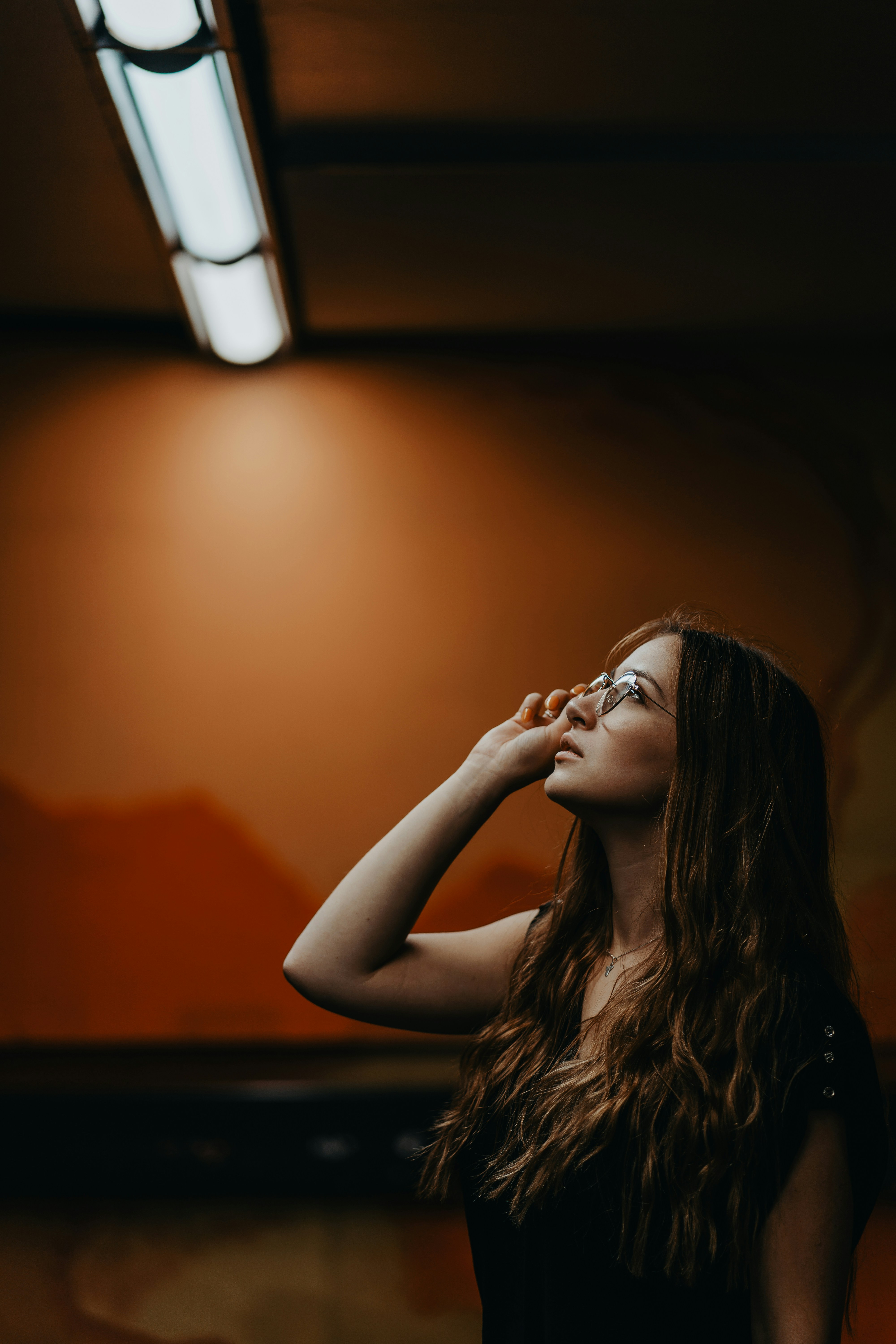 Women looking at a light in a room photo – Free Light Image on Unsplash