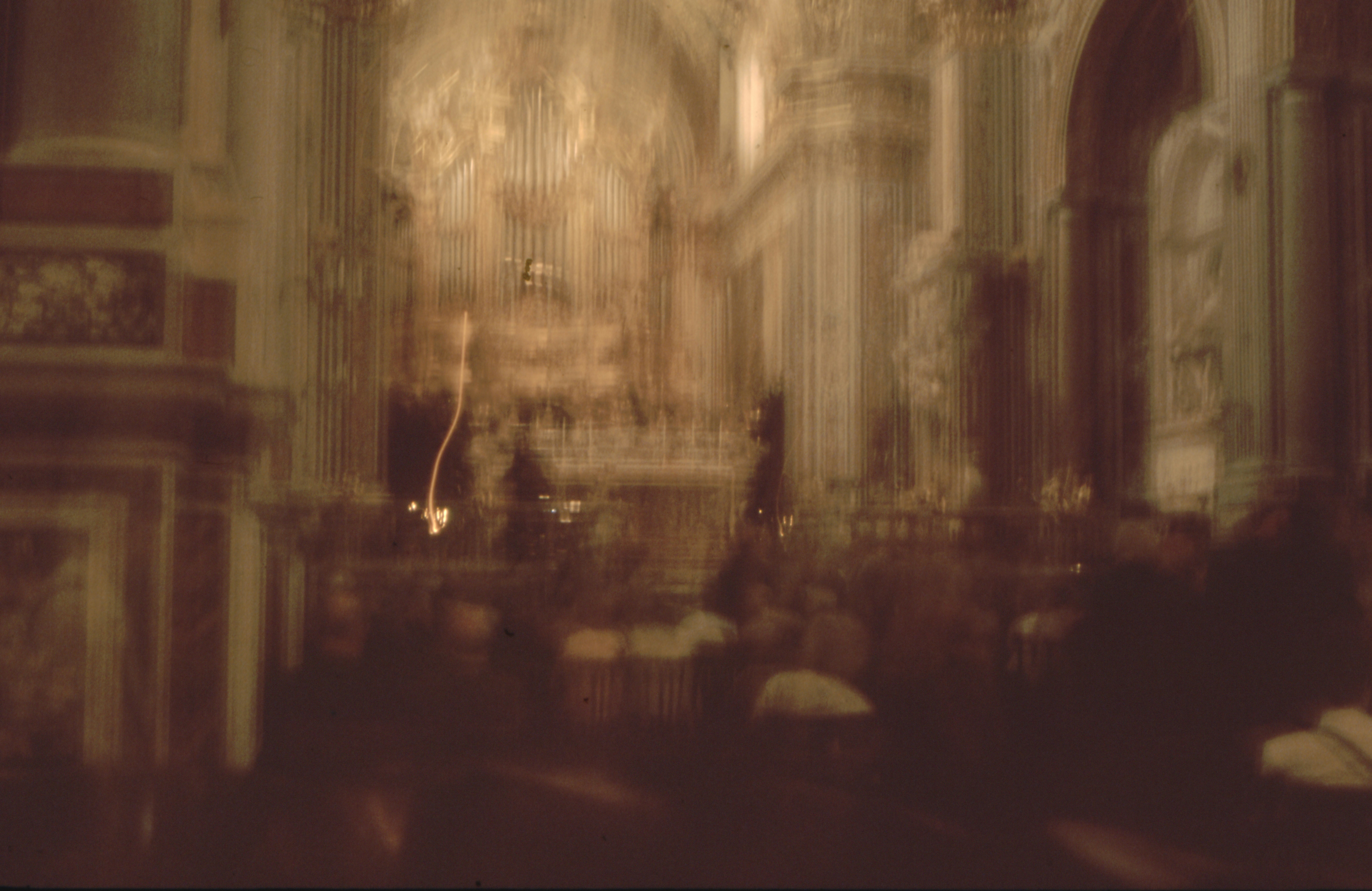 A blurry photo of a church with a large organ photo – Free Art Image on ...