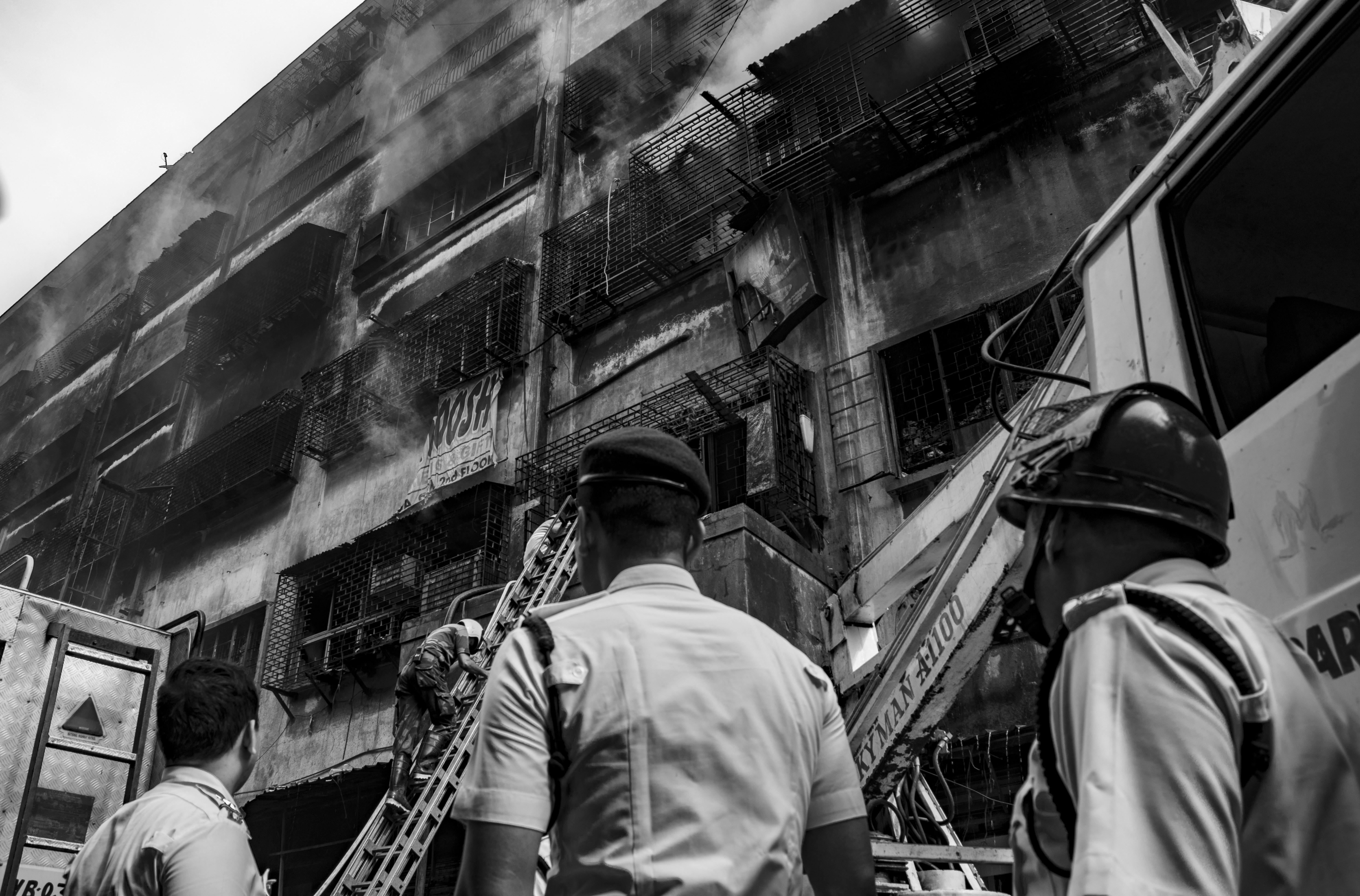 People rescuing people in building photo – Free Current events Image on ...