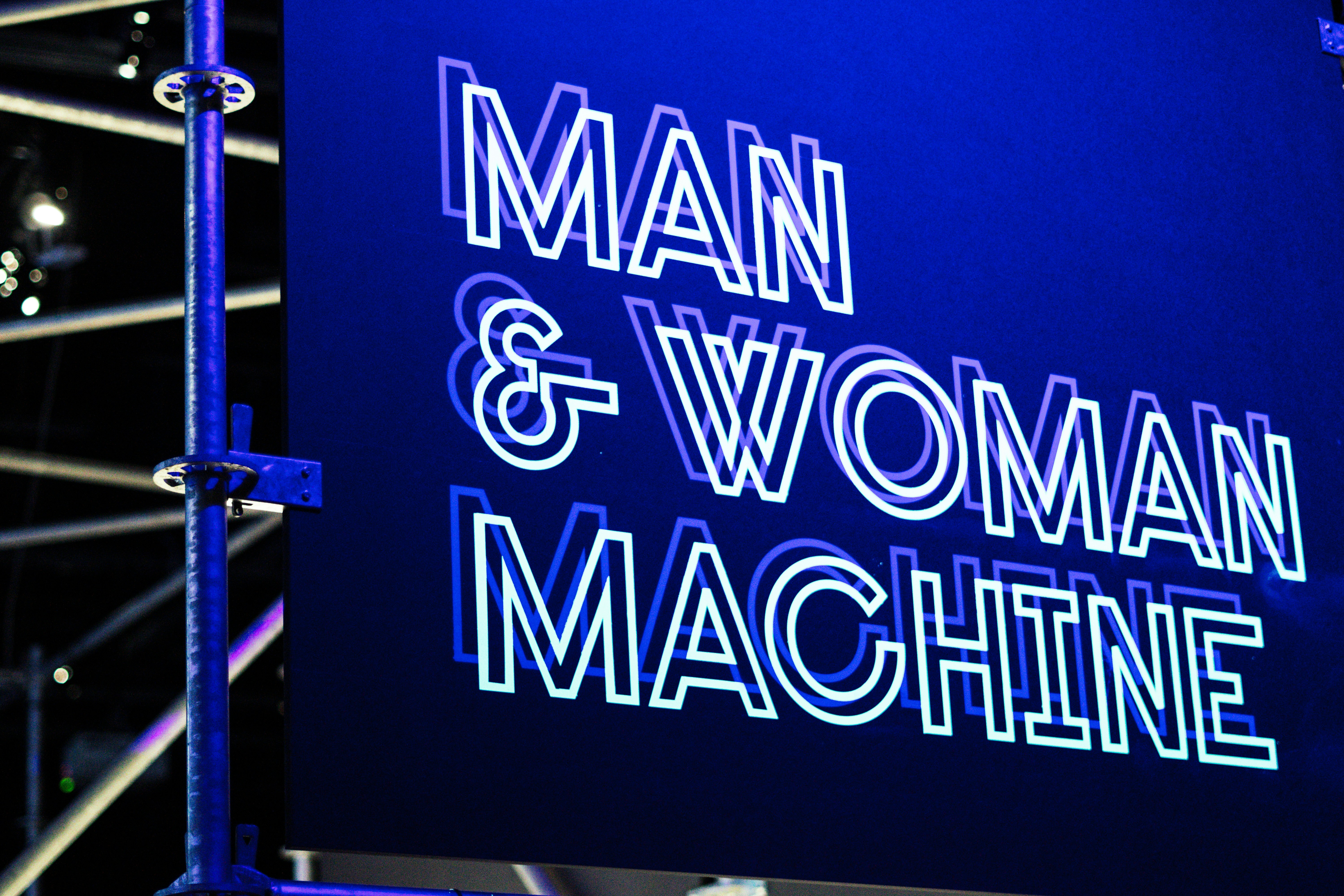 Man and woman machine logo photo – Free Blue Image on Unsplash