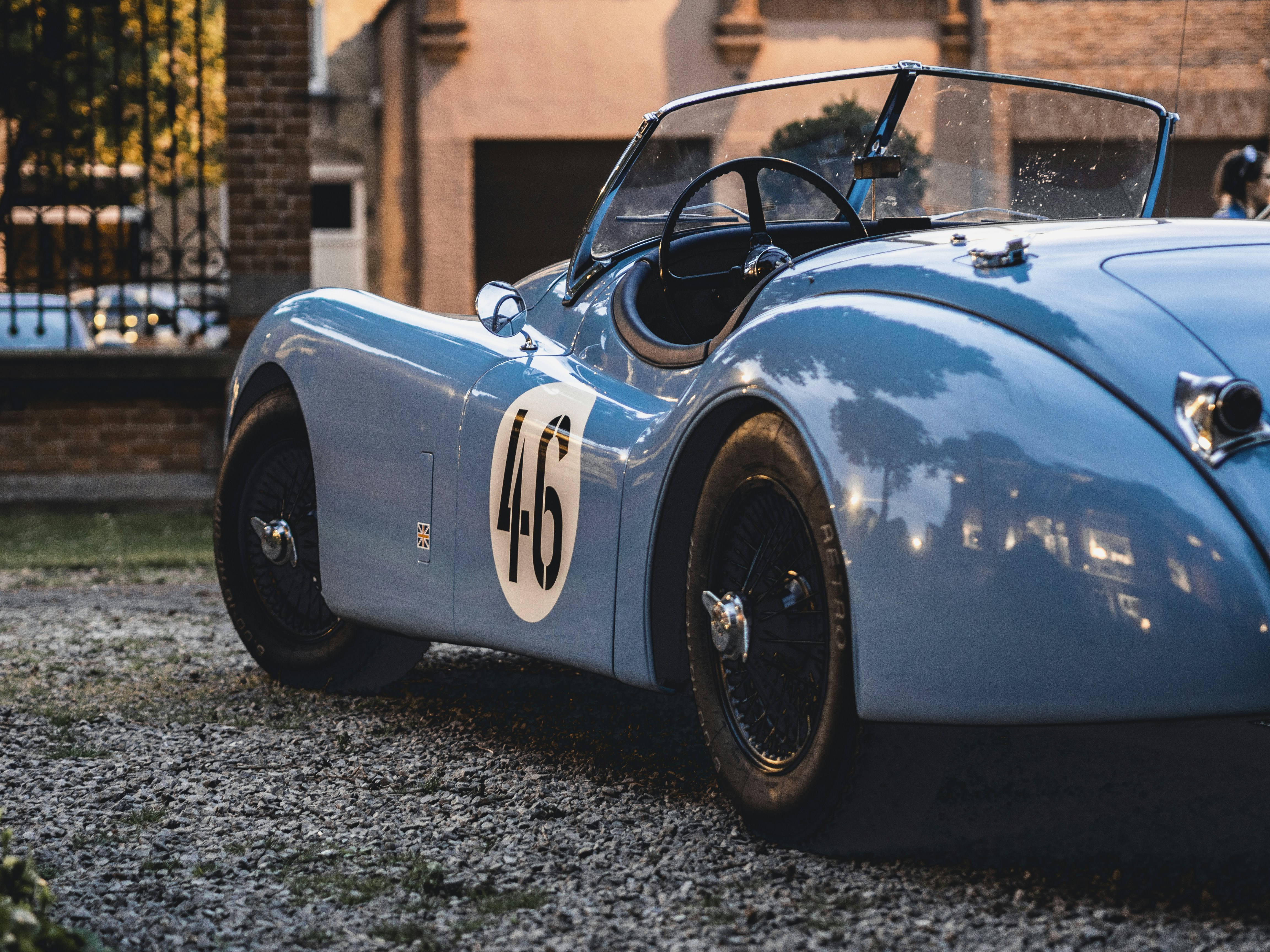 Close-up photo of blue convertible car parked outside during daytime ...