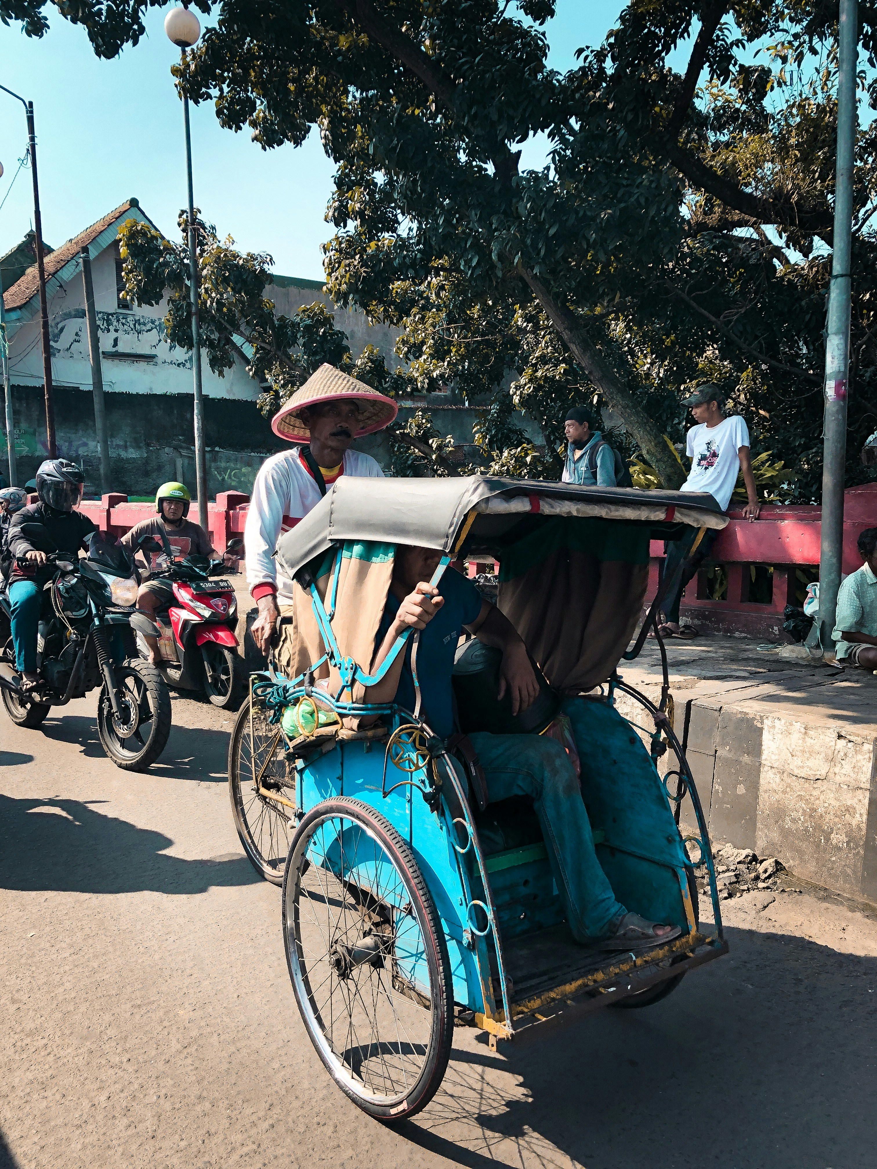 Man sitting in blue and brown rickshaw photo – Free Machine Image on ...