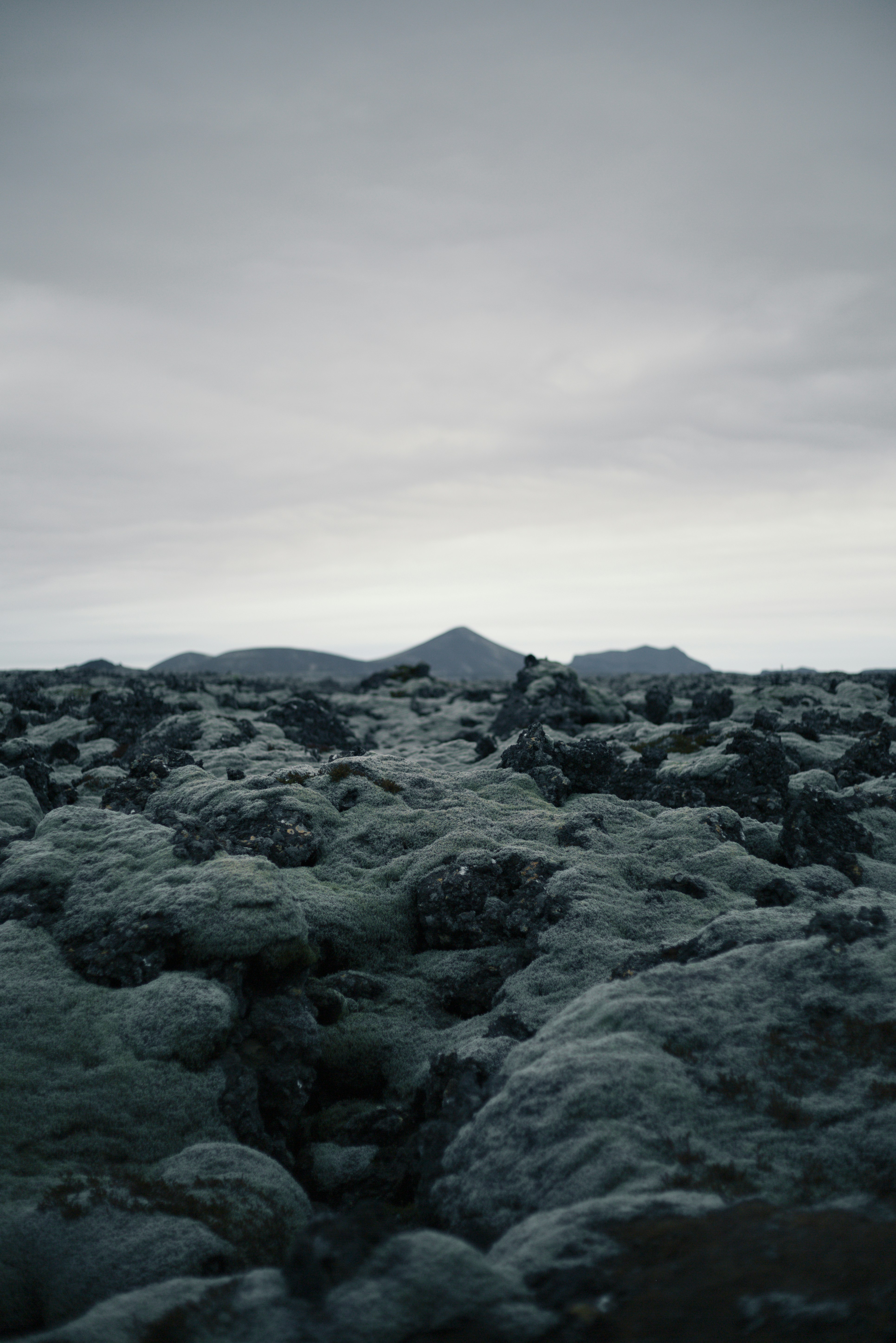Gray rocky mountain under white cloudy sky during daytime photo – Free ...