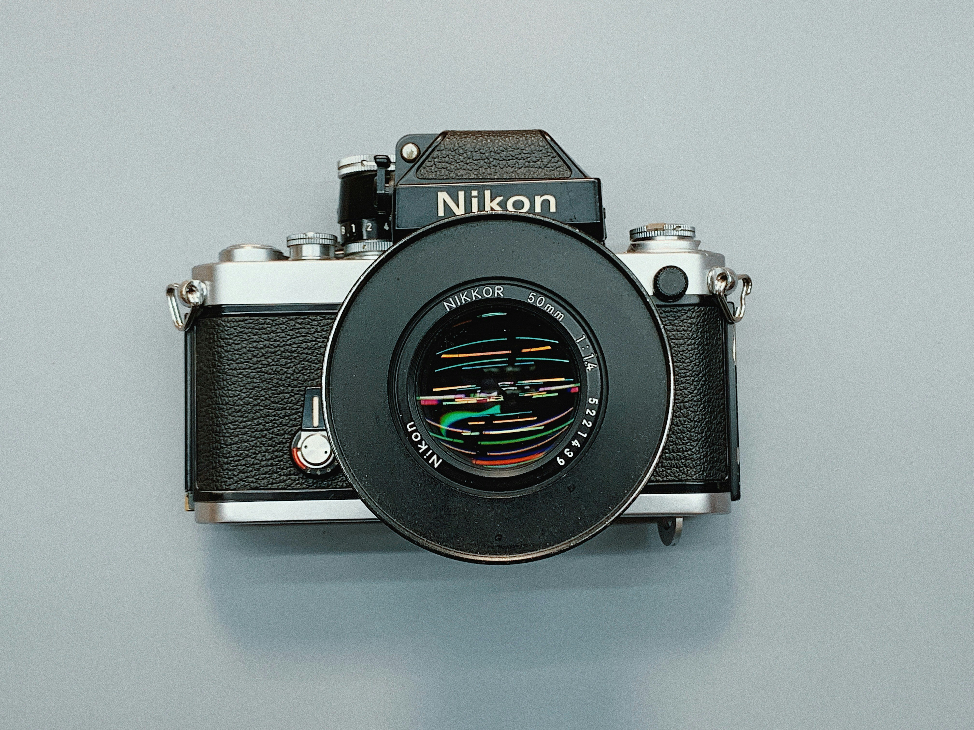 Black and grey Nikon DSLR camera photo – Free Camera Image on Unsplash