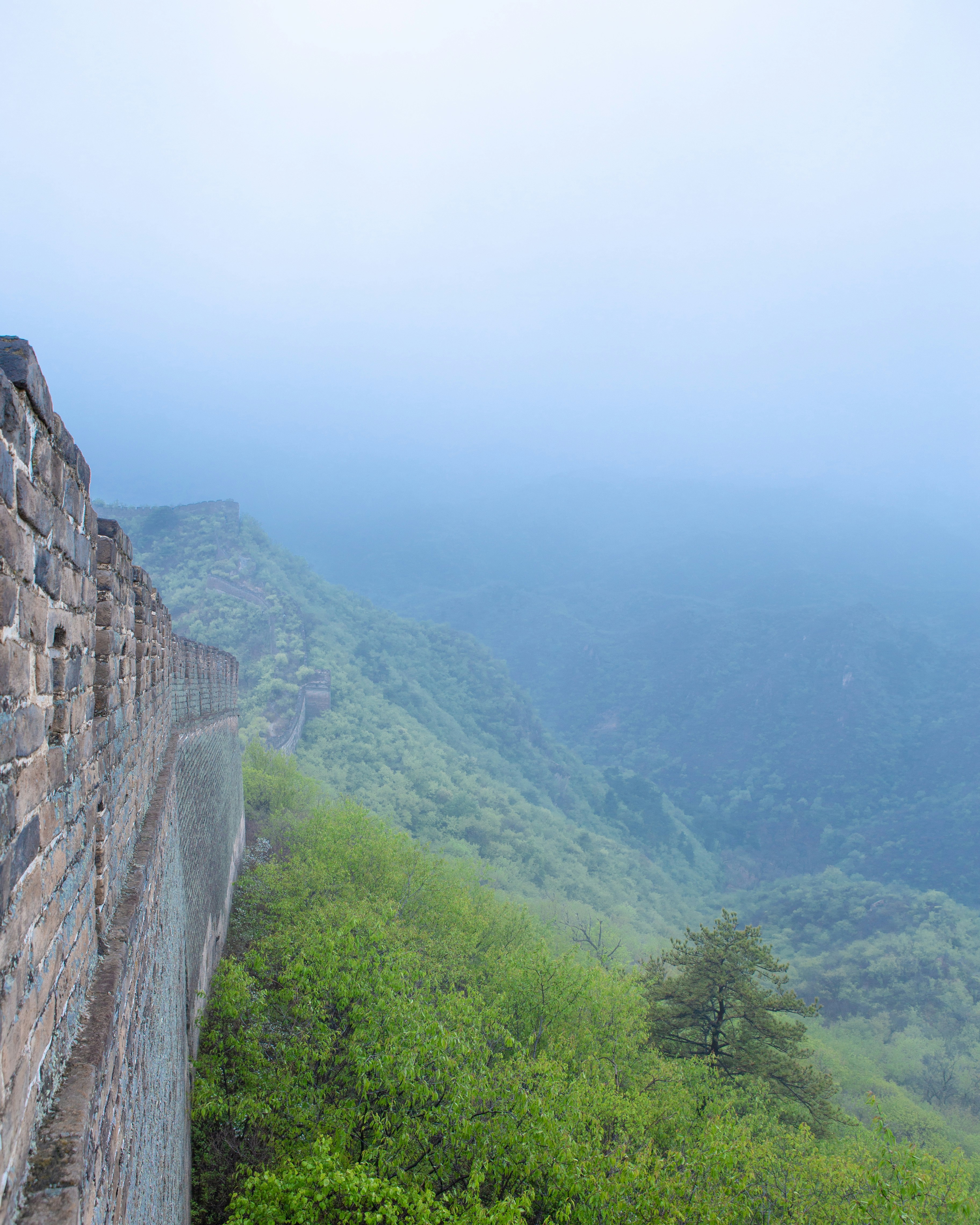 Edge of the Empire: Great Wall Tracing a Mist-Wrapped Mountain Ridge
