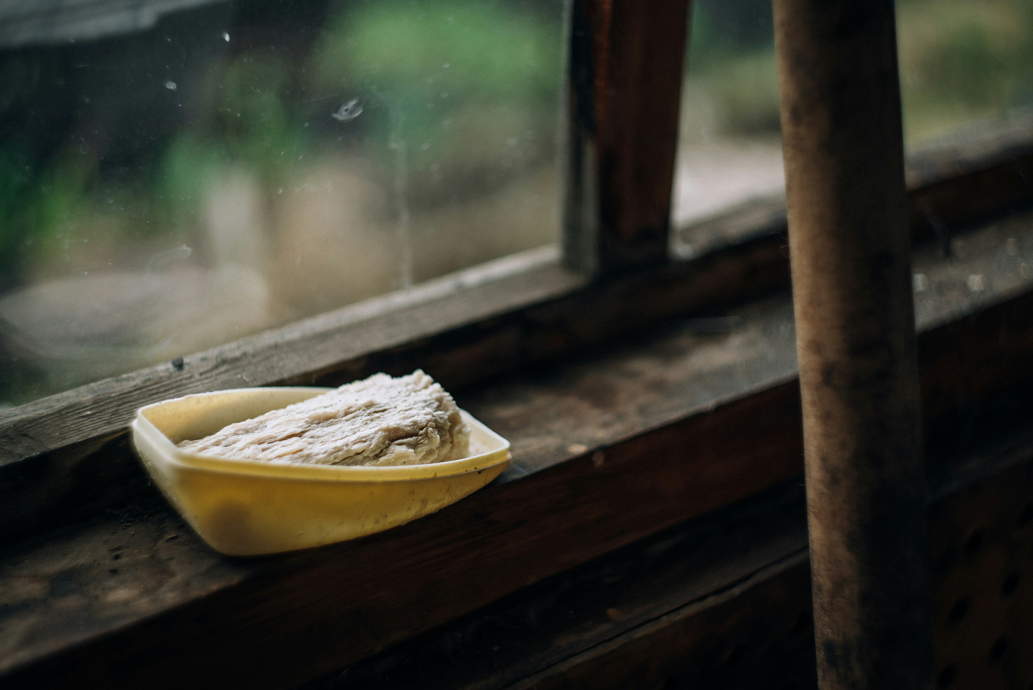 Hushed Morning Flour on a Weathered Windowsill