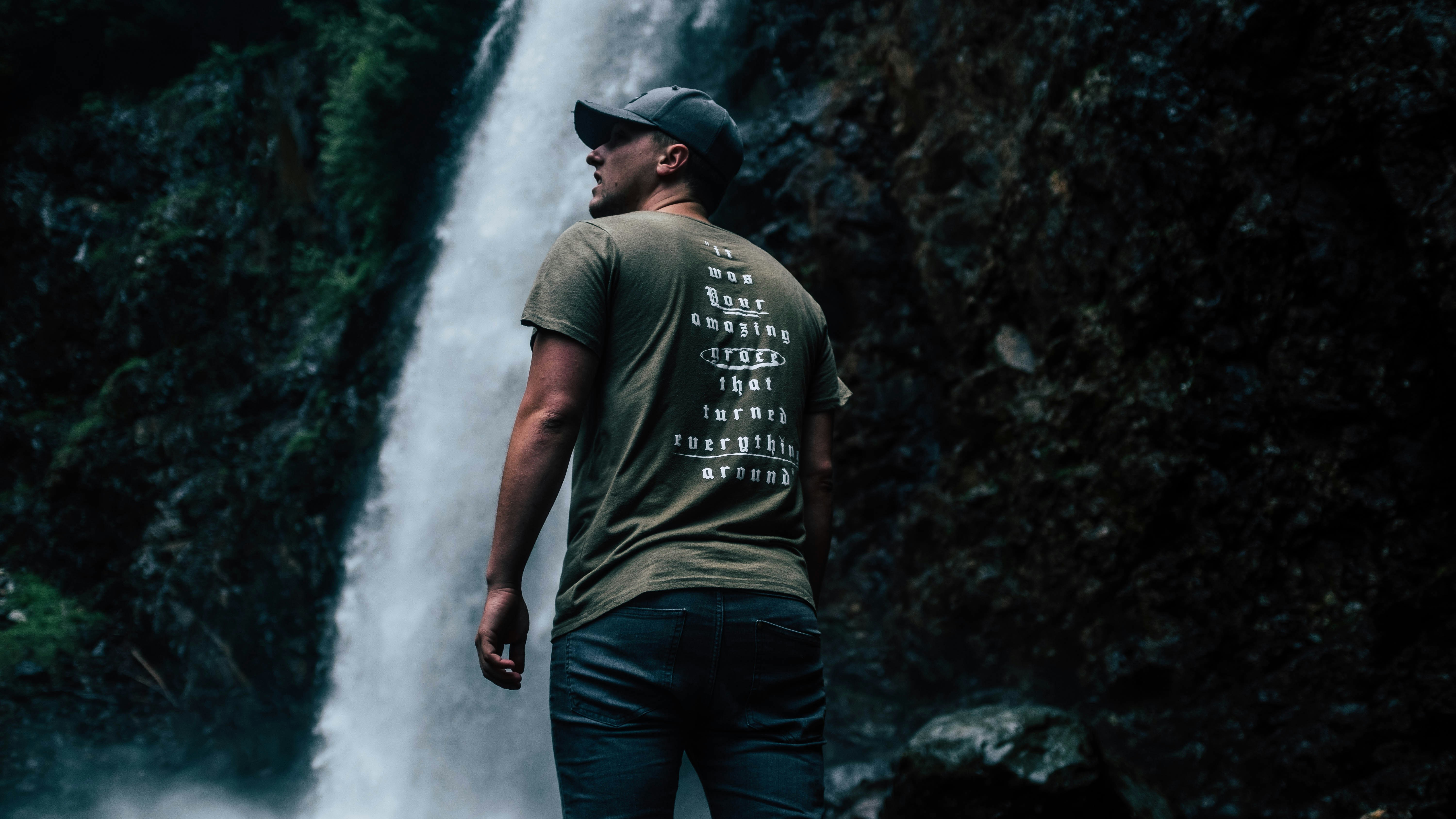 Between the Cascade and the Cast: Man in a Quiet Grotto
