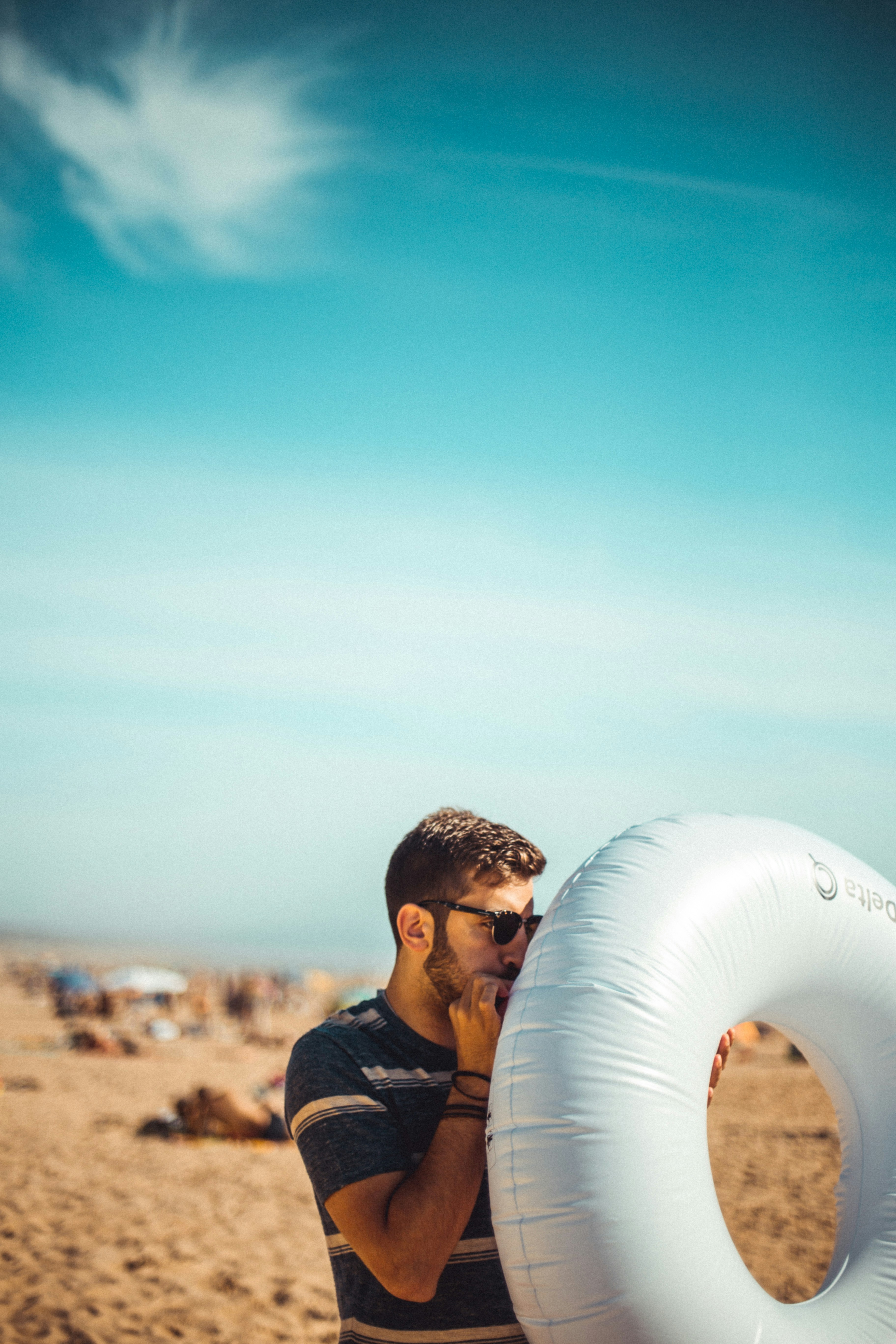 Circle of Calm: Portrait by a White Lifebuoy Beneath a Cerulean Sky