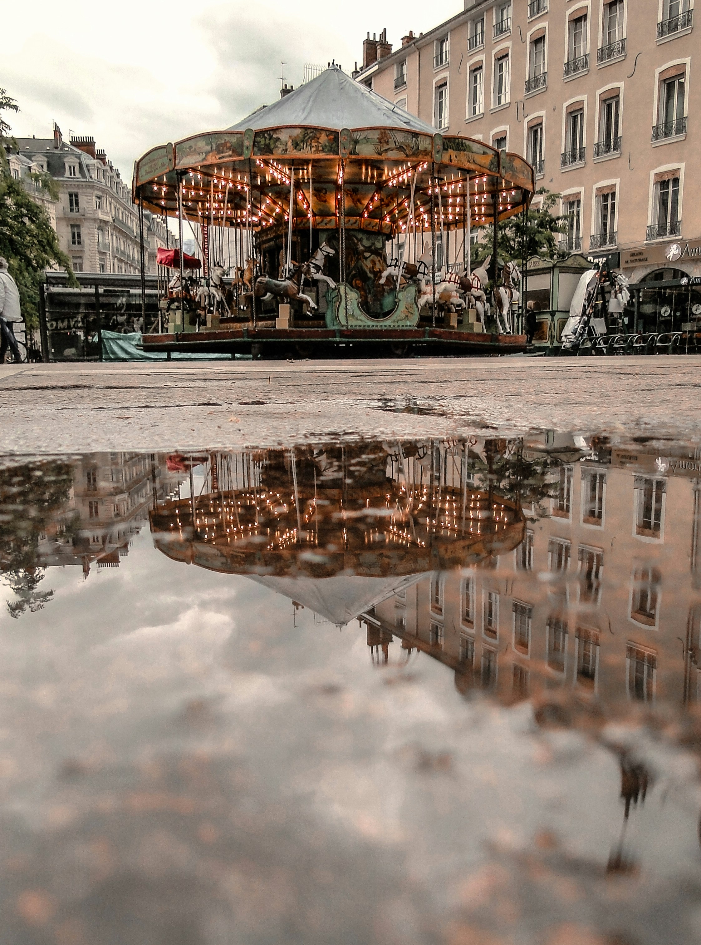 Waltz of Lights in a Rain-Warmed City Square