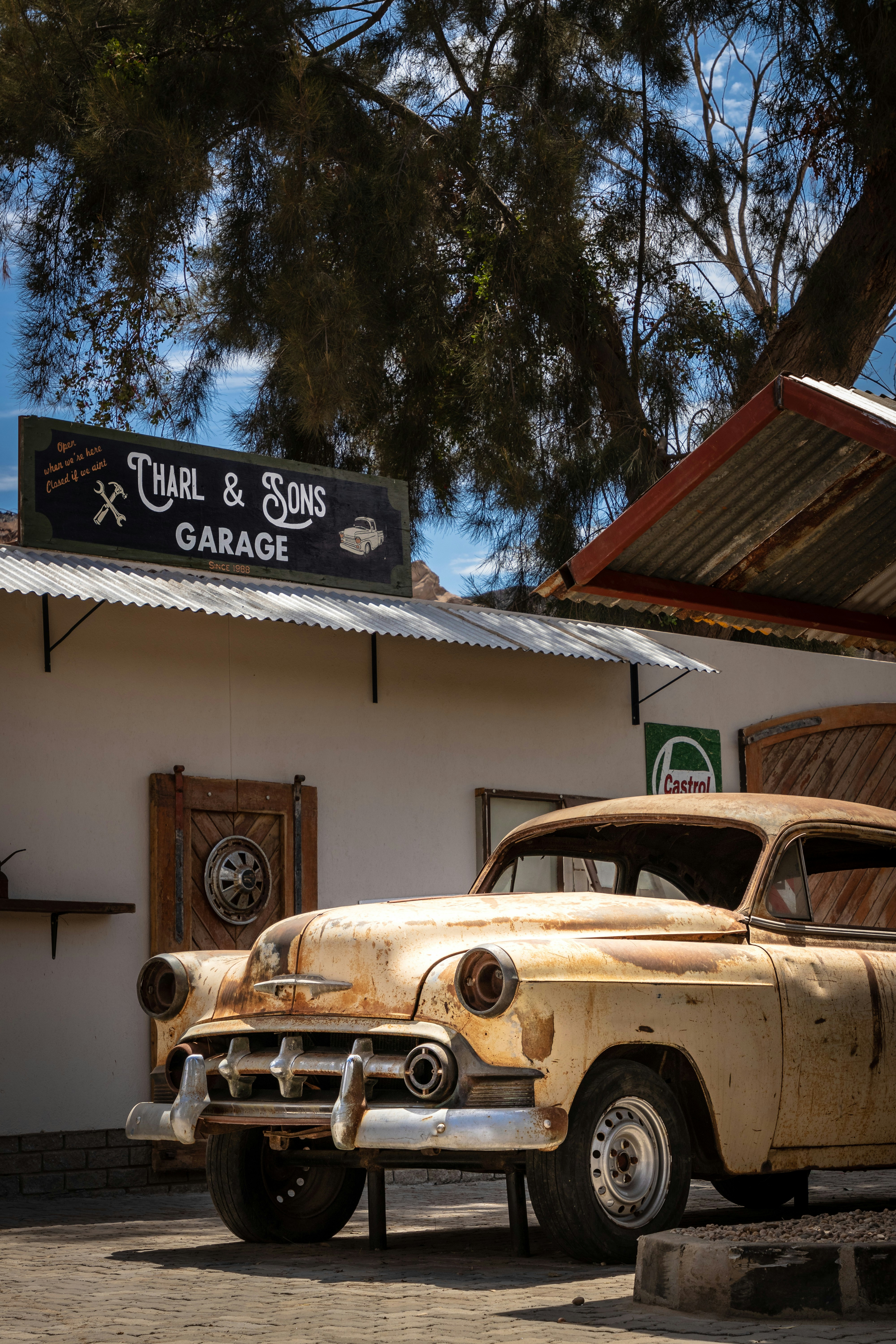 Rusty Chevrolet in the Shade of a Vintage Garage