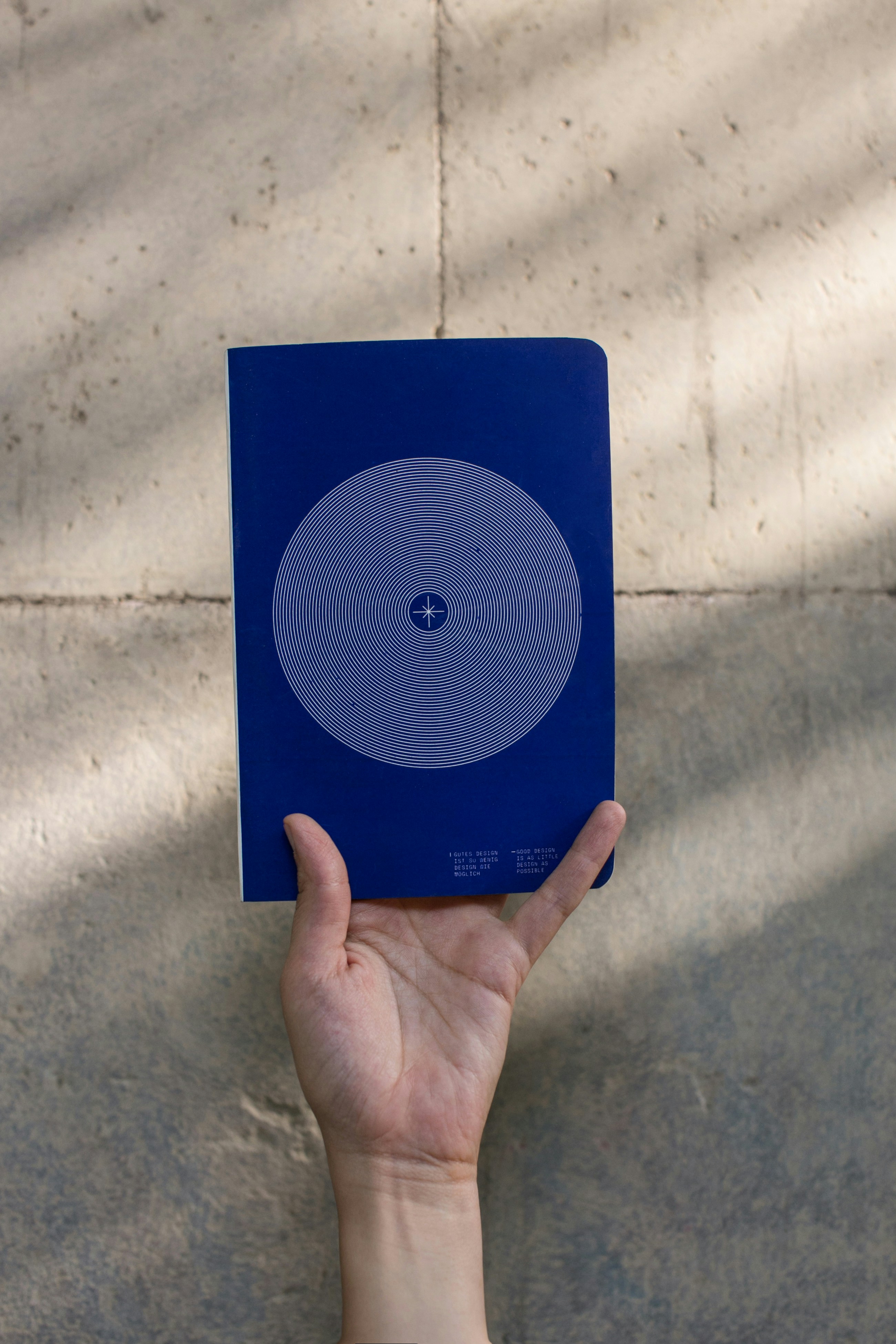 Blue Circular Patterned Journal in Hand