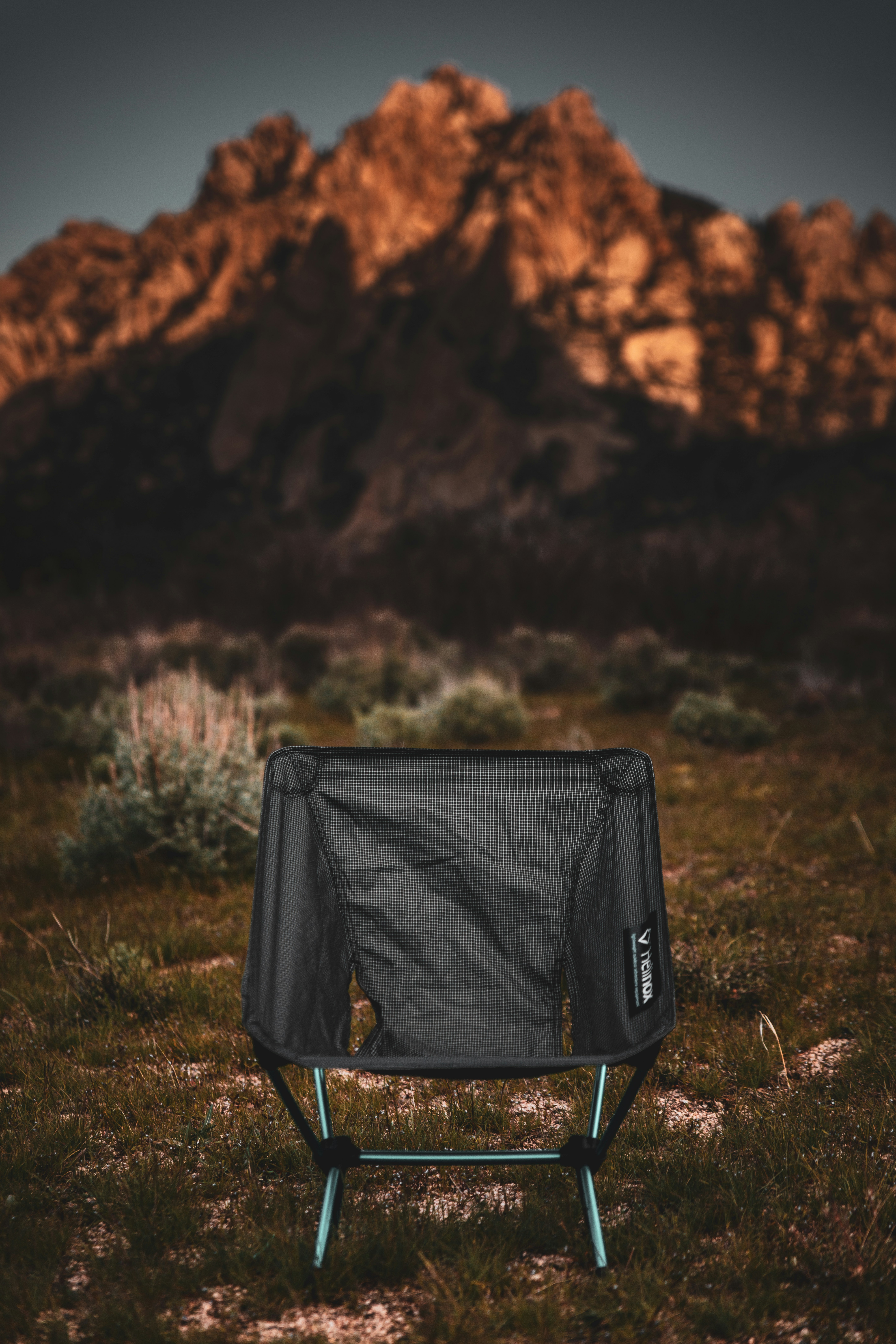 Desert Chair Under a Mountain Sunset