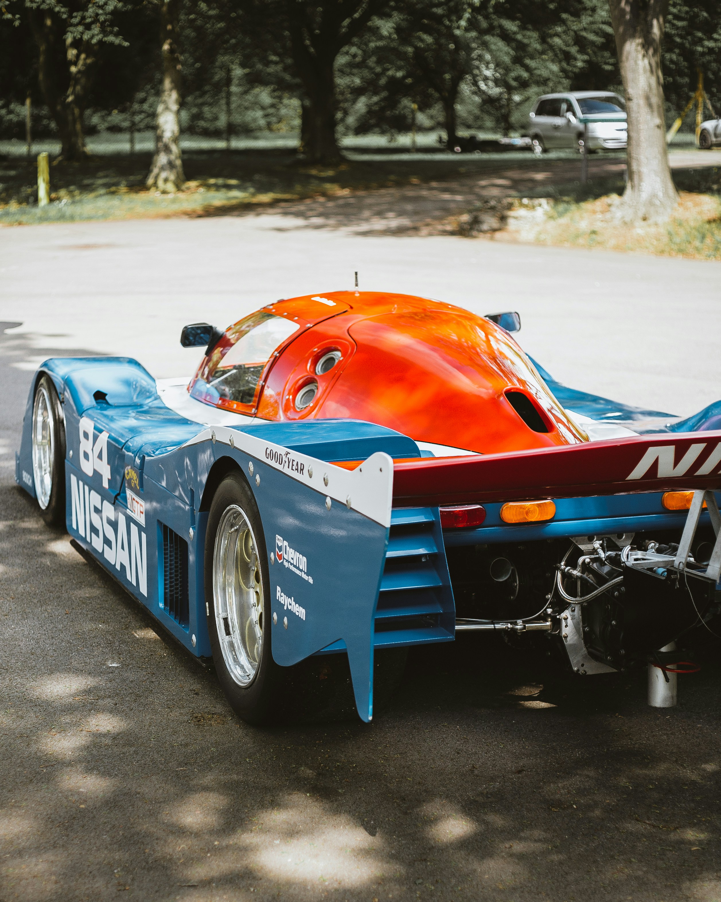 Orange and blue racing car photo – Free Vehicle Image on Unsplash