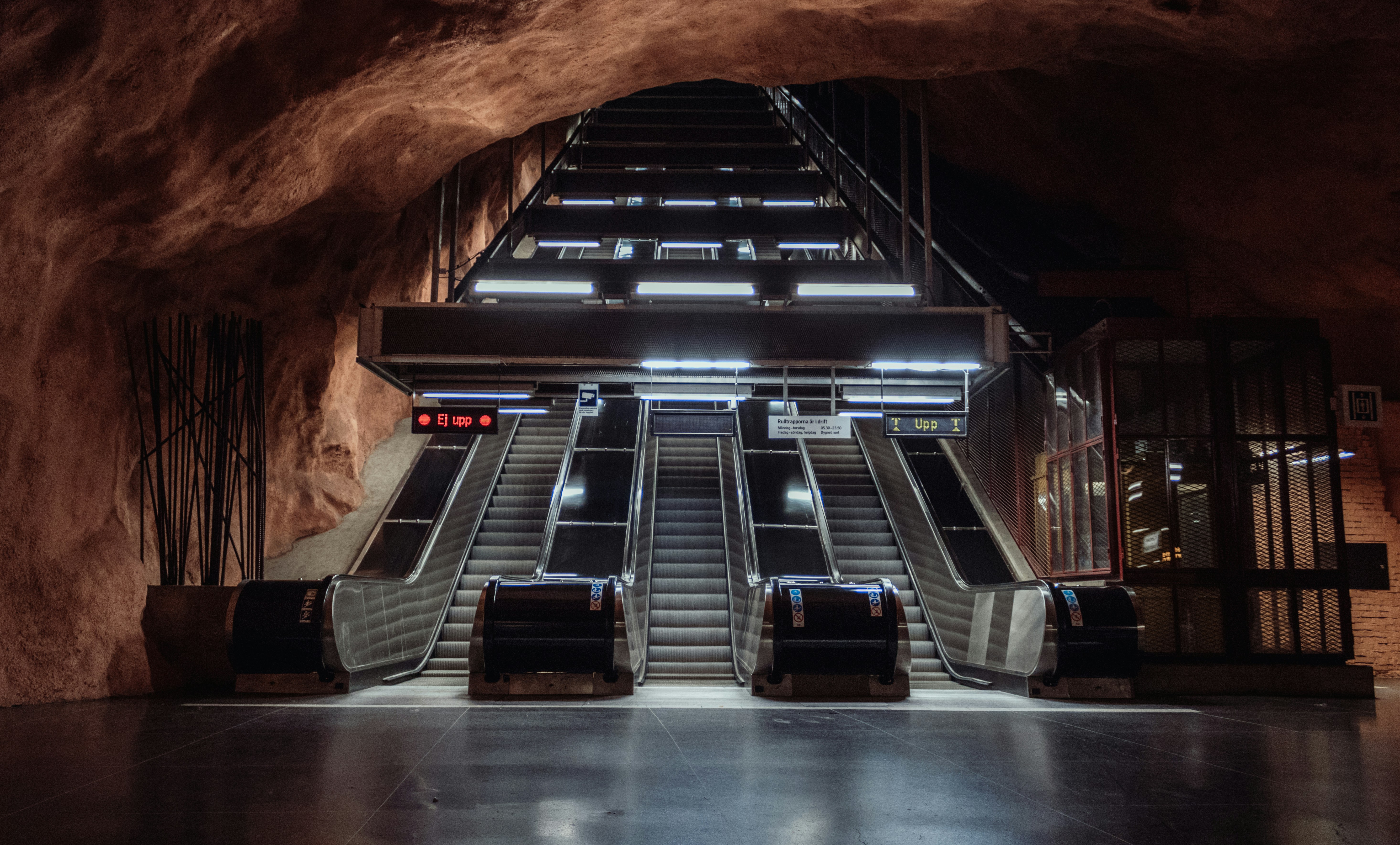 Empty three escalator inside cave photo – Free Train Image on Unsplash