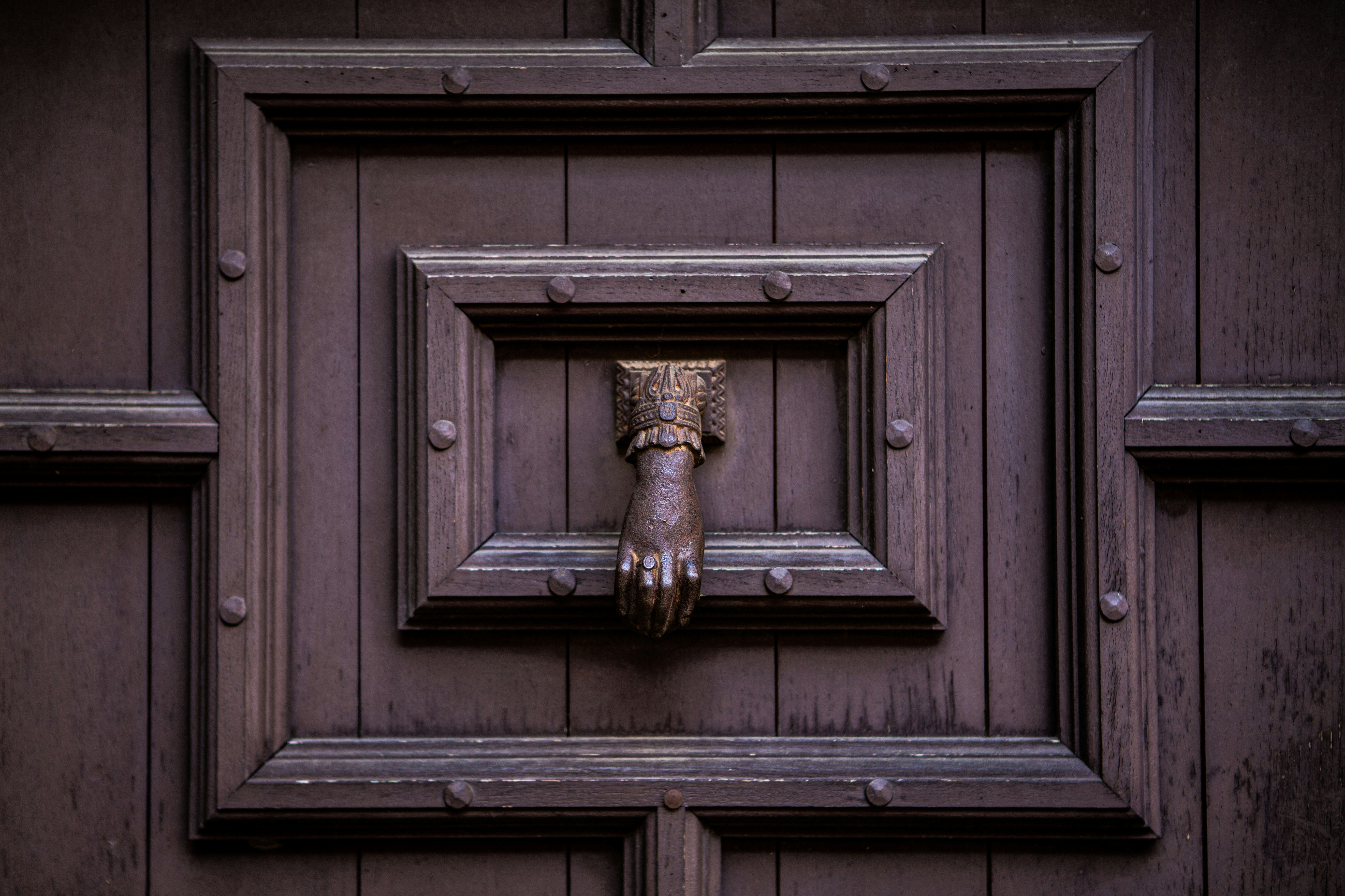 Hand mid-relief on the wall photo – Free Door Image on Unsplash