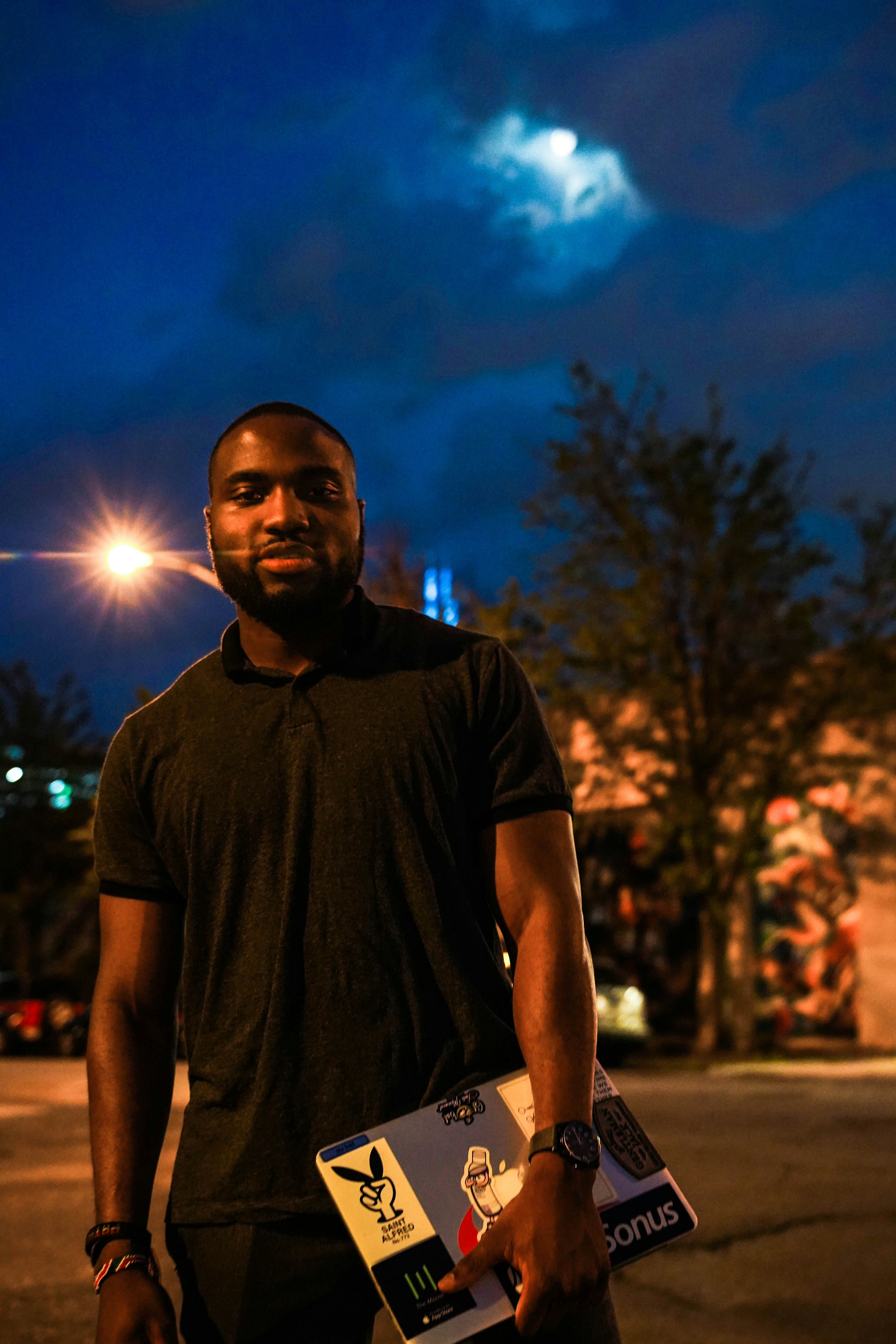 Moonlit Avenue Portrait: Confidence Under a Streetlamp