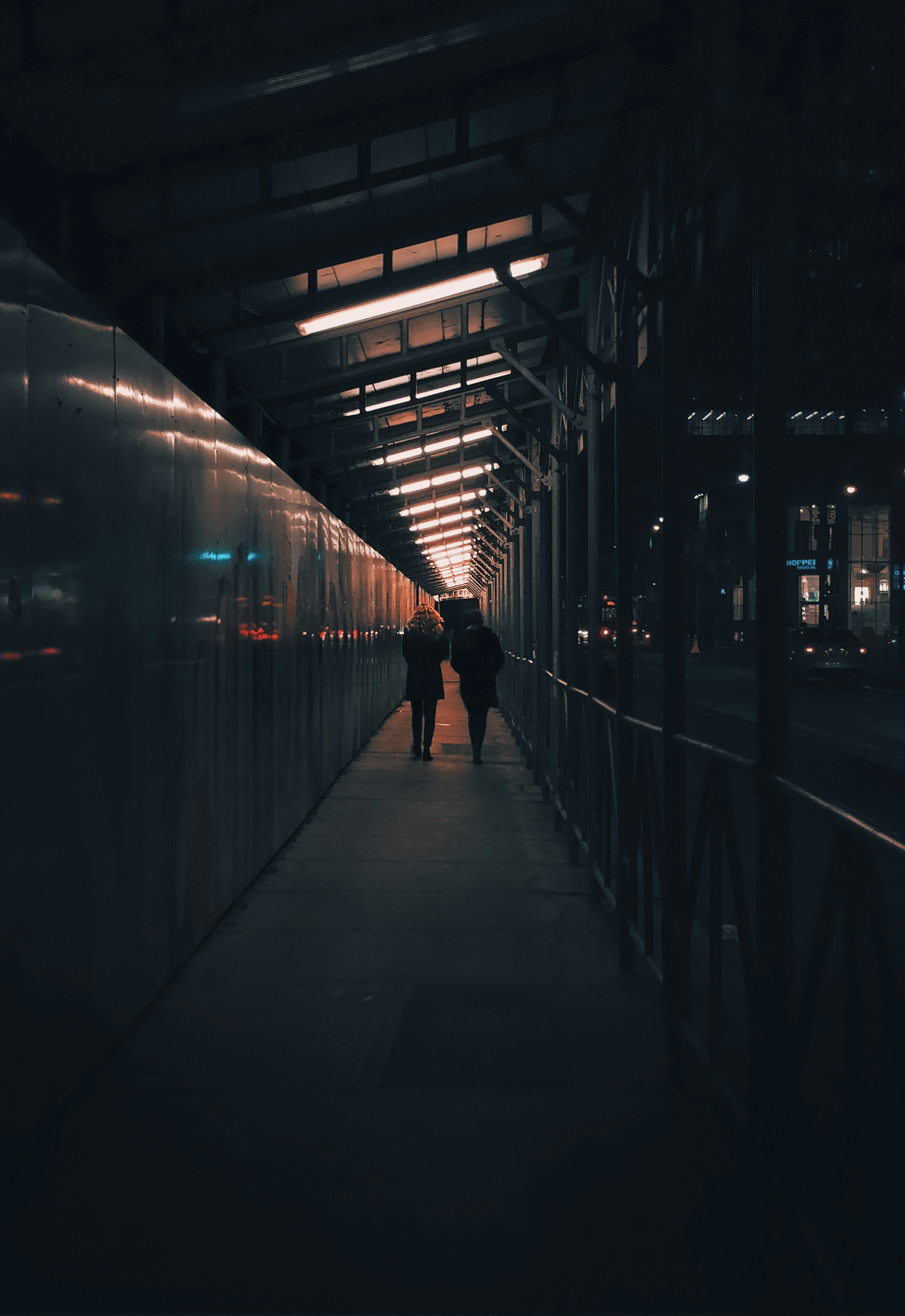 People walking between building photo – Free Streets Image on Unsplash