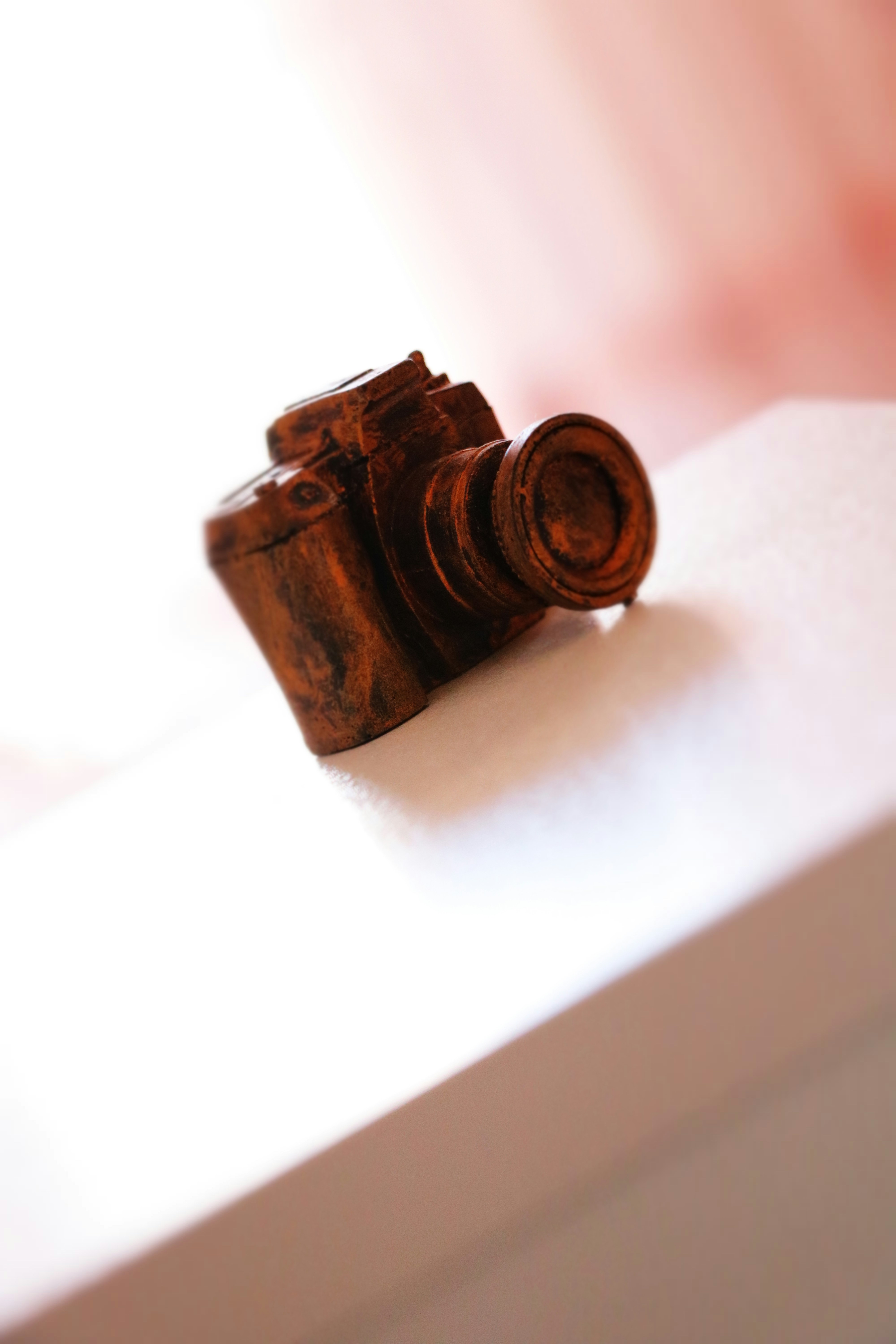 Rusty relic: a tiny camera abandoned on soft snow