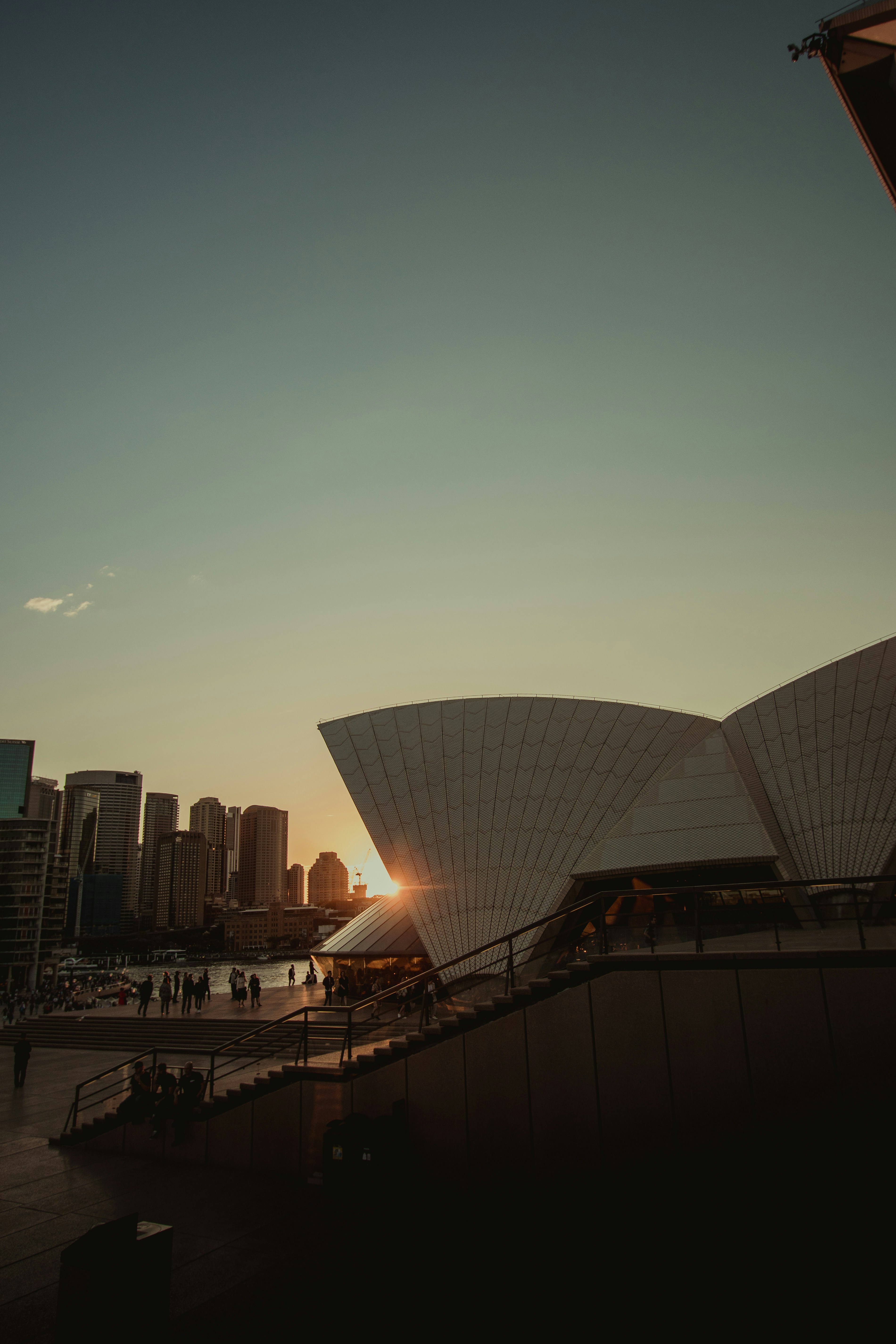 Sunrise Over the Opera House: silhouette and cityscape at harbourfront