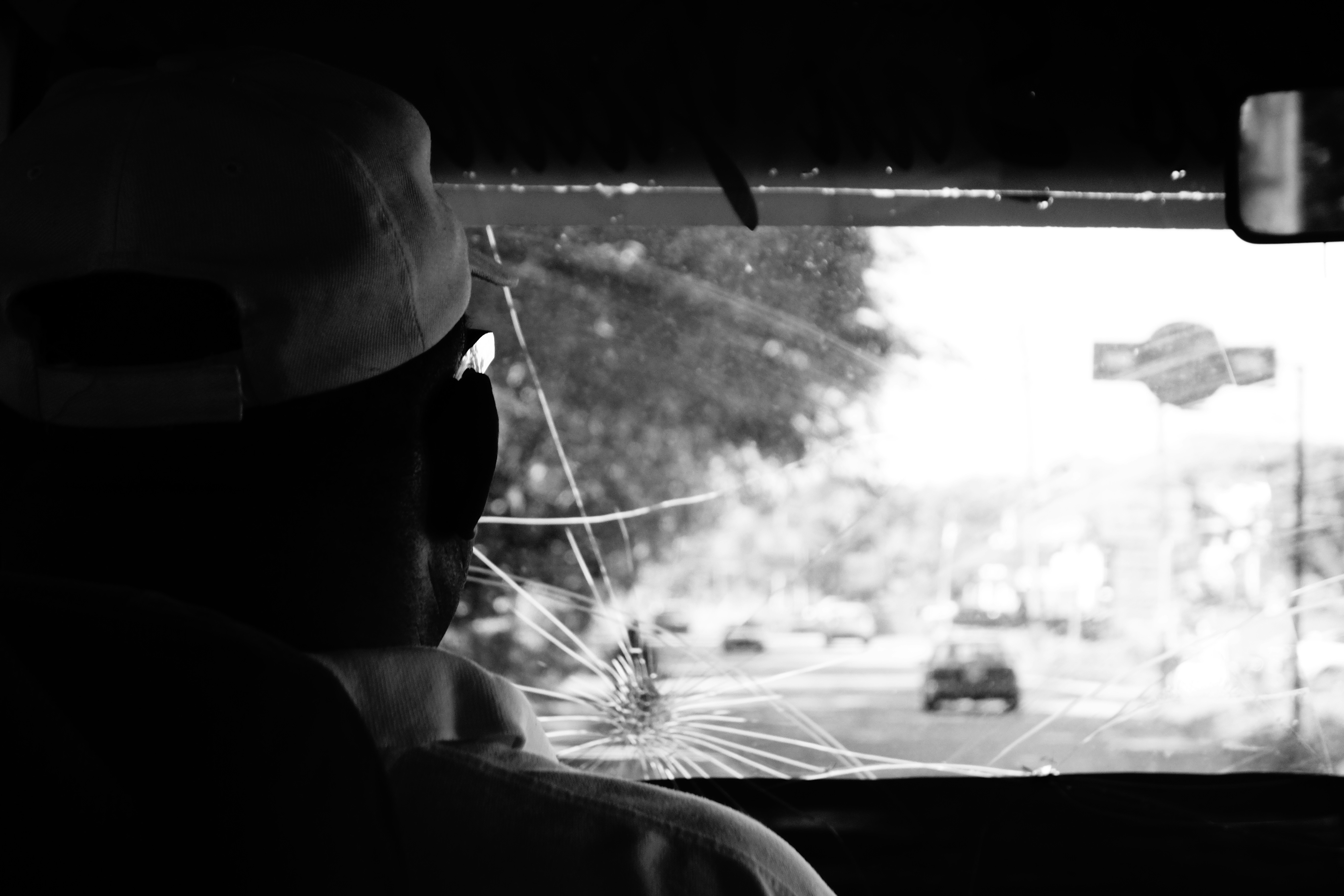 Cracked Glass, Moving City: View from the Backseat