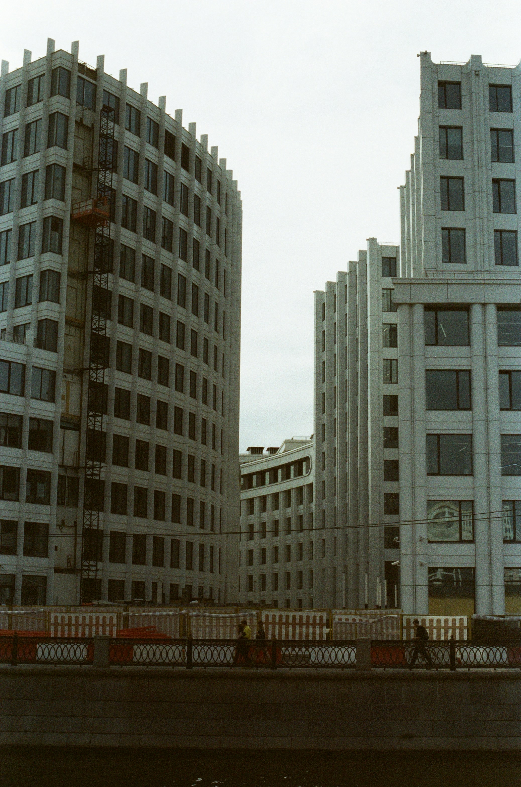 Concrete Canyon: Two Skyscrapers Framing a Quiet Street