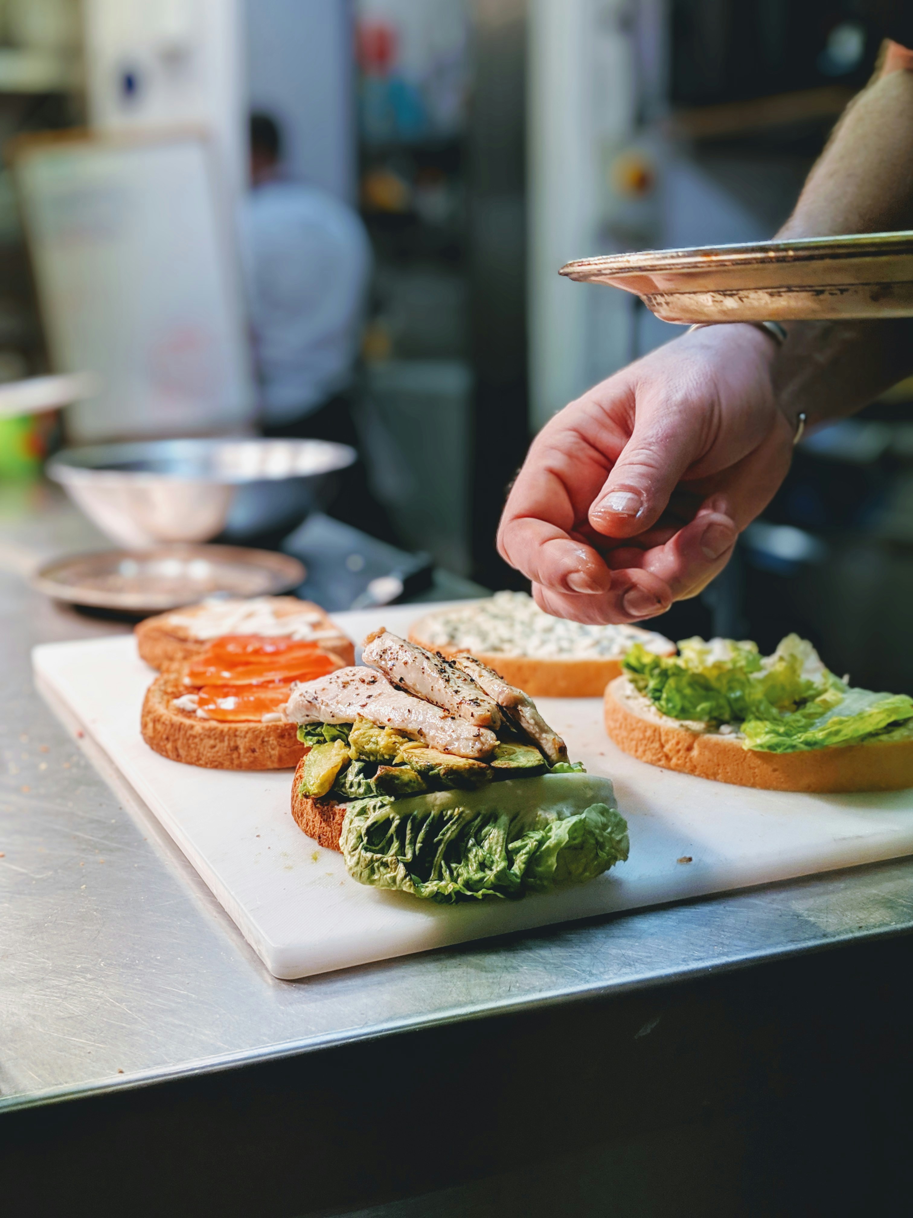 Person making burger photo – Free 31 crompton st Image on Unsplash