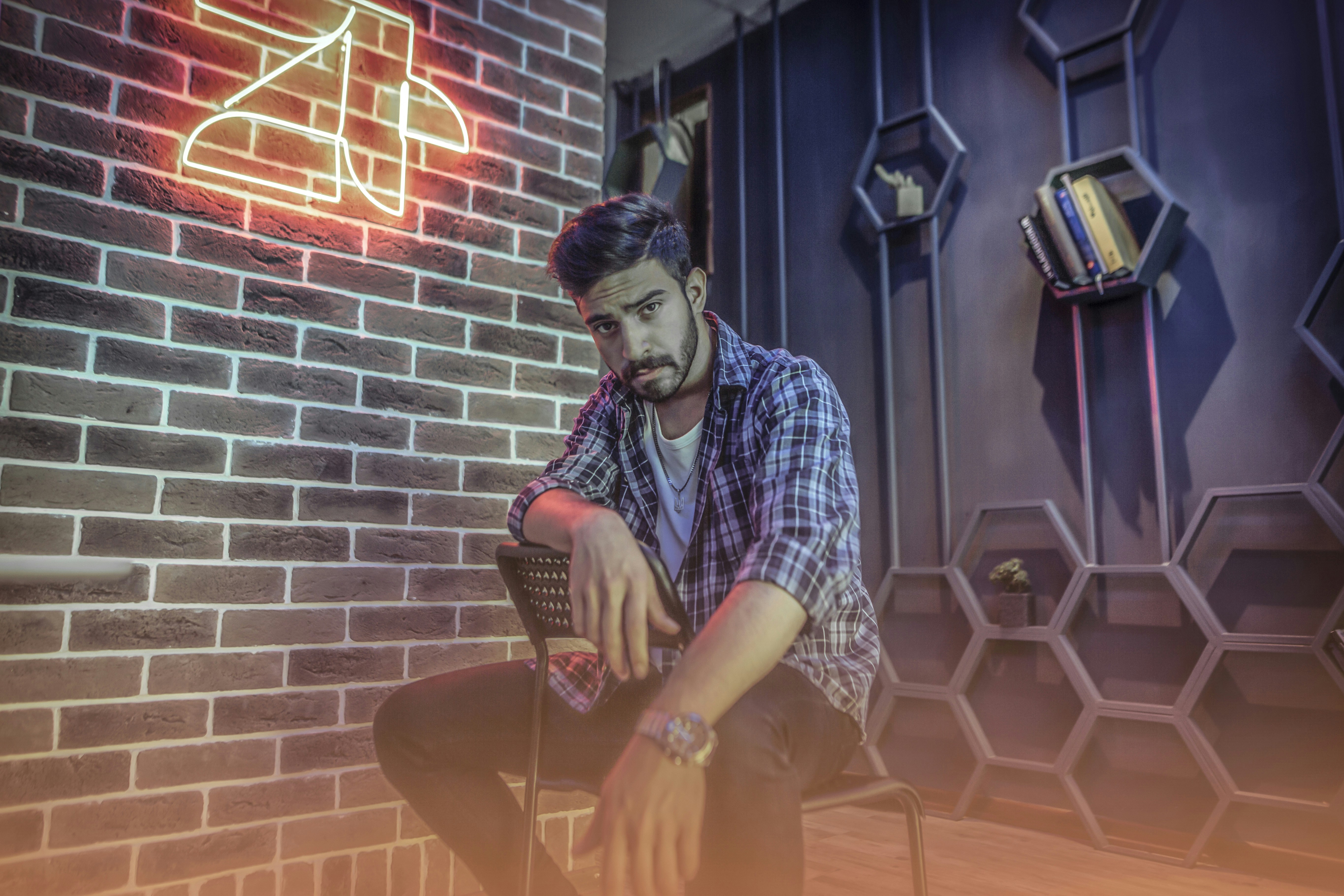 Neon Tide: A Casual Moment in a Geometric Neon Lounge