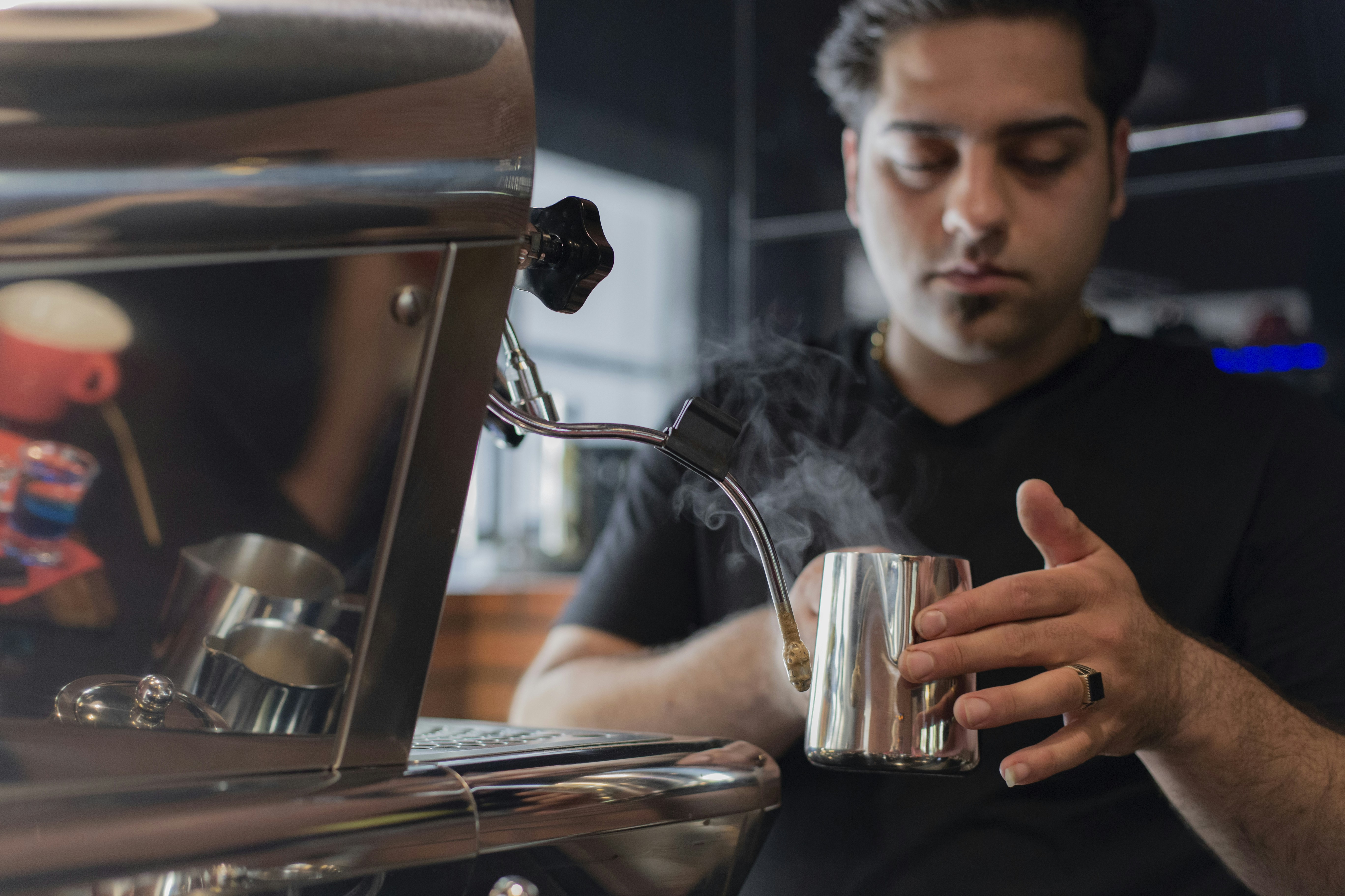 Man holding silver pitcher photo – Free Mashhad Image on Unsplash