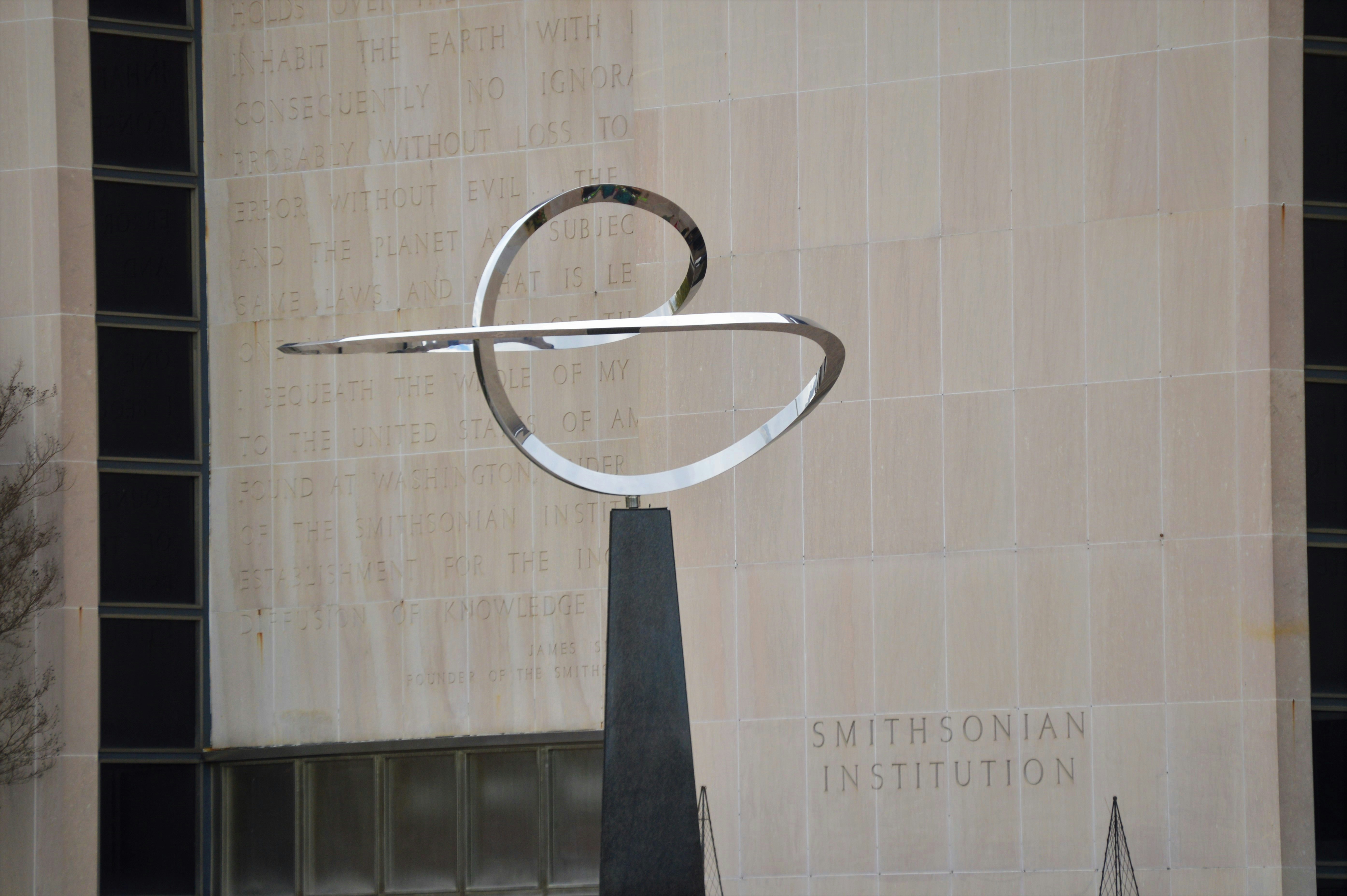 Orbiting Ring Over a Monumental Pedestal at the Smithsonian