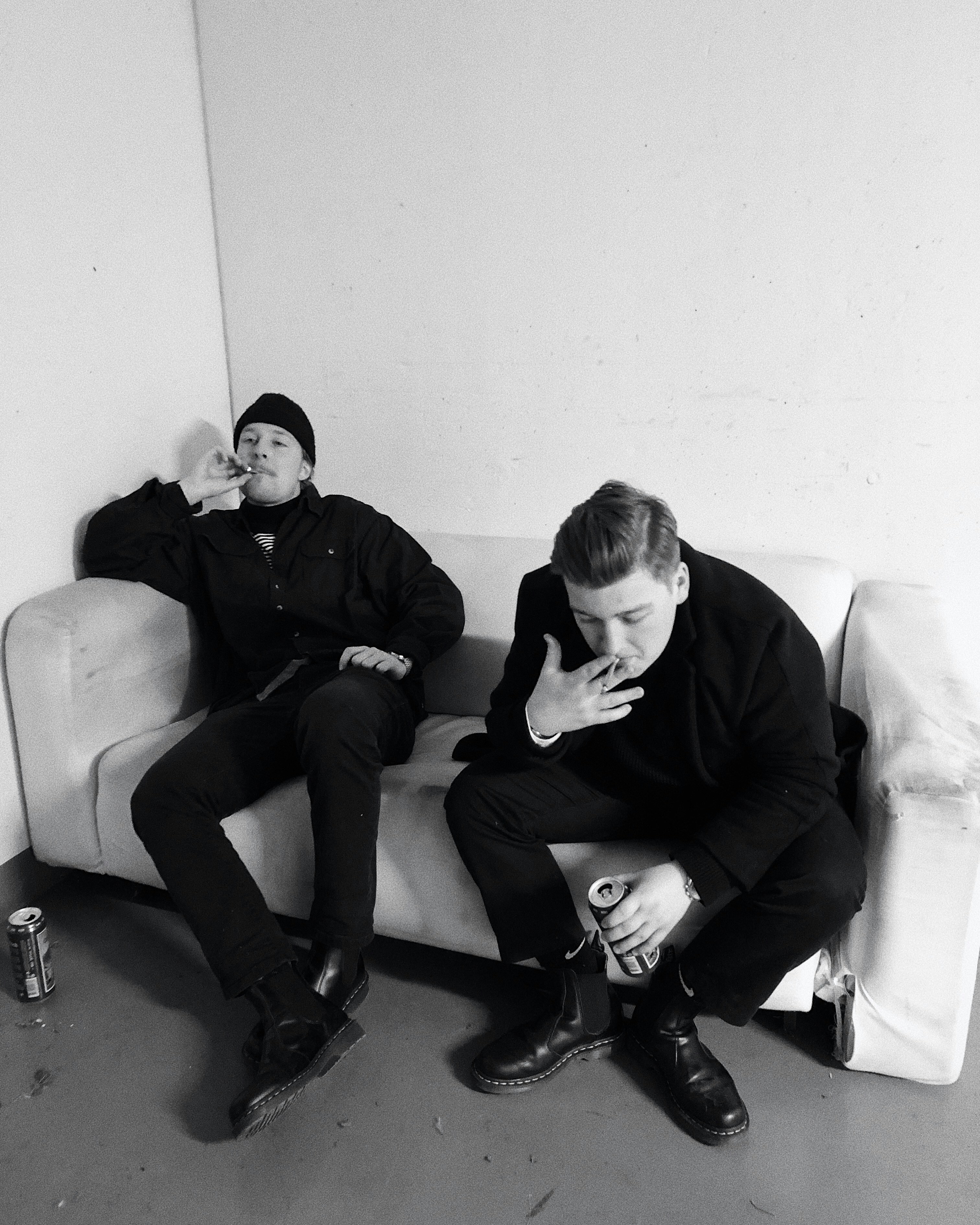 Noir on the Sofa: A Quiet, Smoke-Kissed Moment