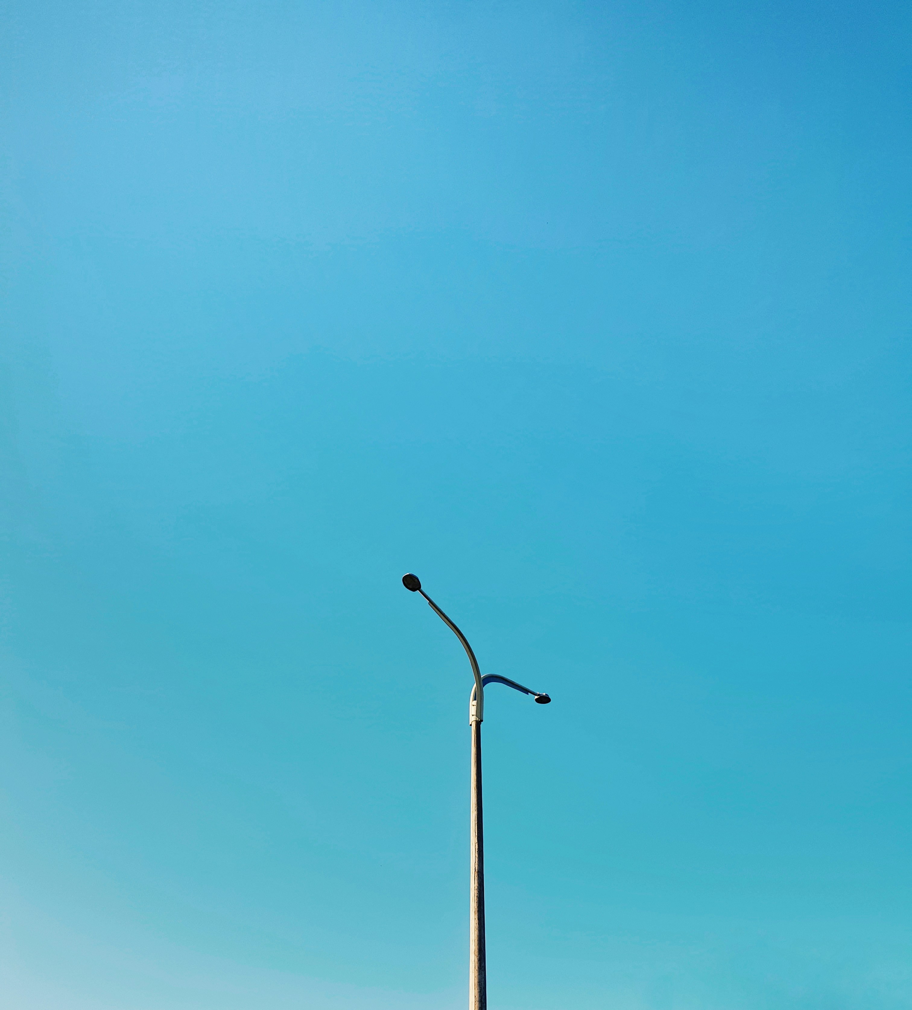 Gray metal post during daytime photo – Free Blue Image on Unsplash
