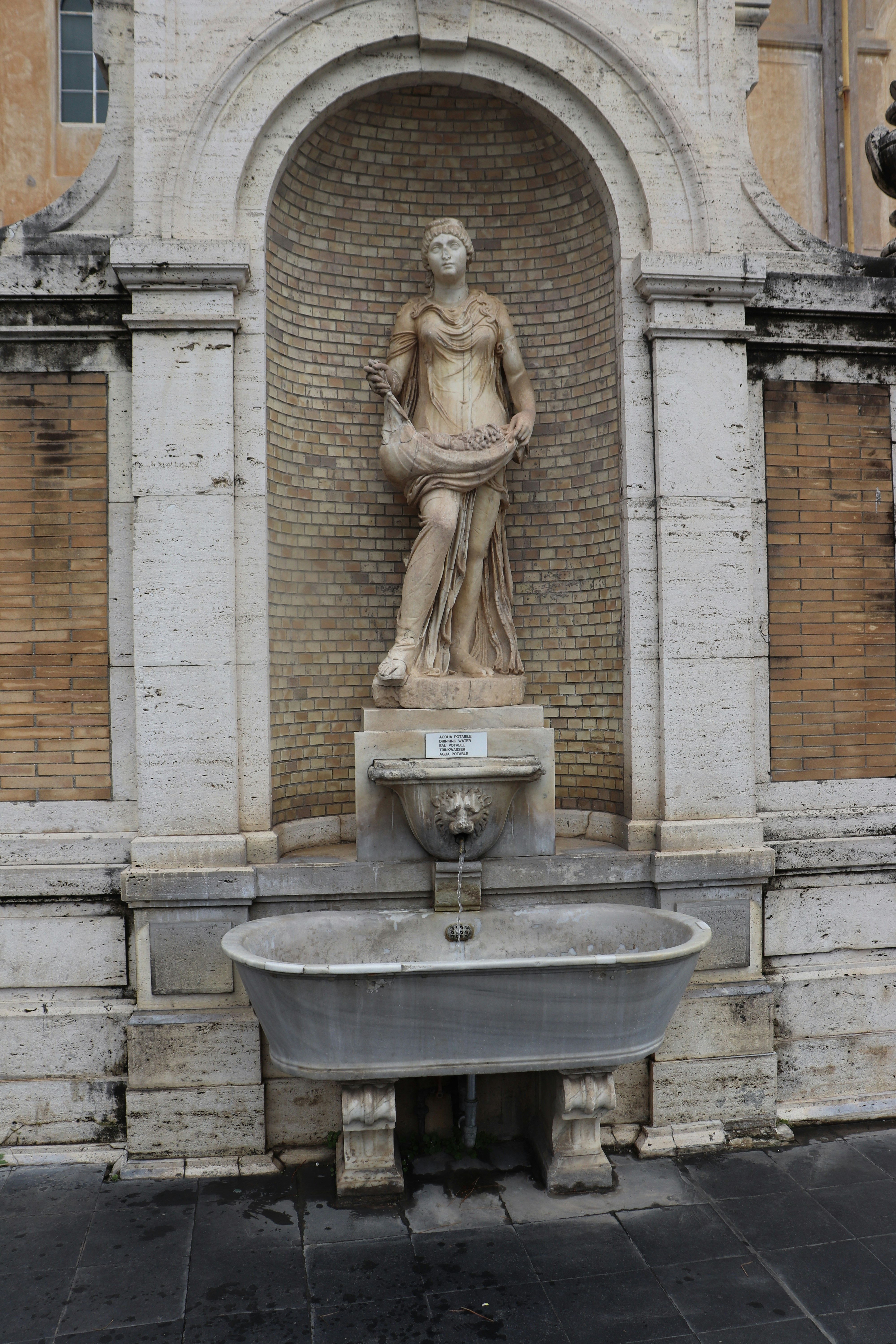 Woman standing above bathtub statue photo – Free Art Image on Unsplash