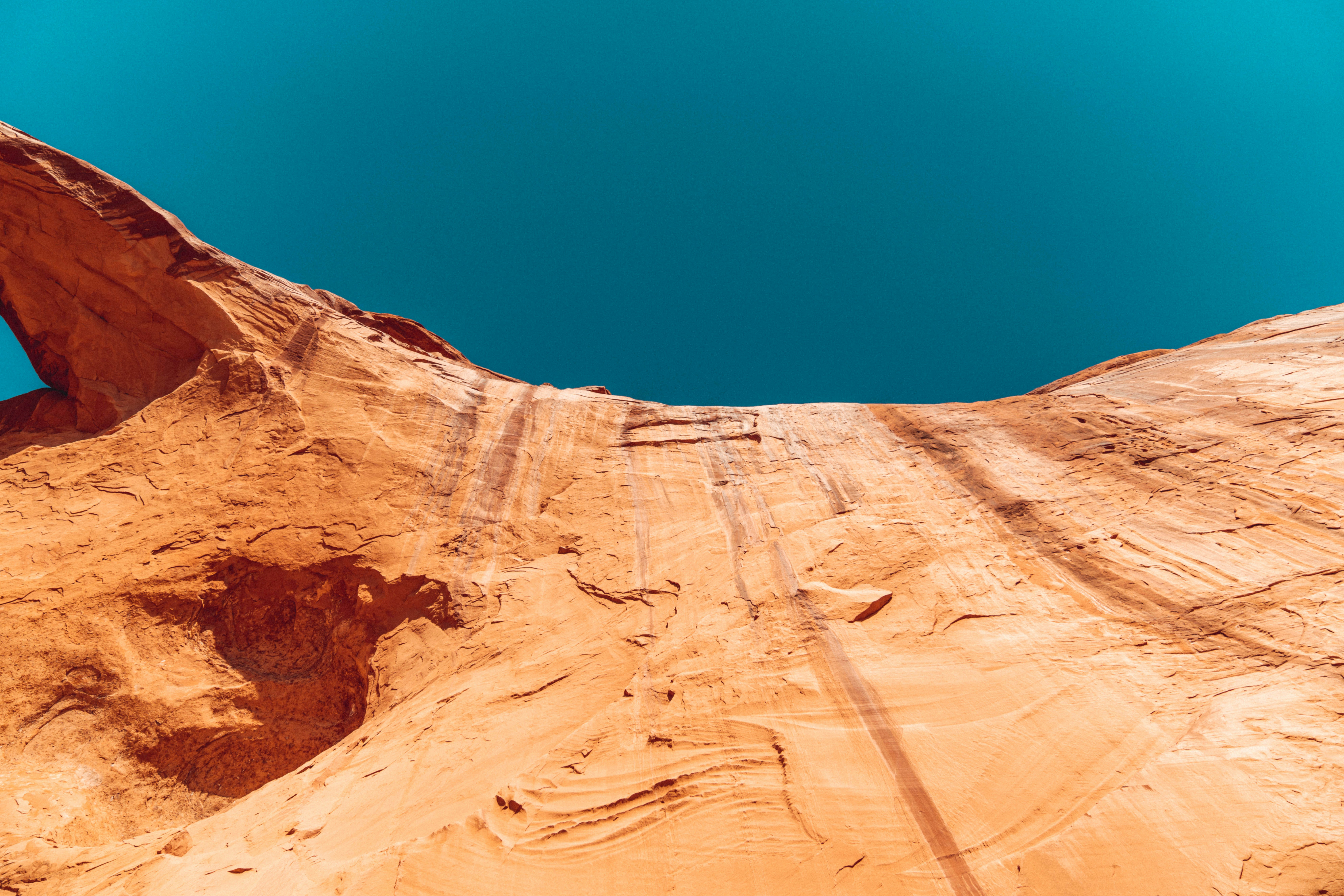 Emberstone Facade Ascends into a Cerulean Sky