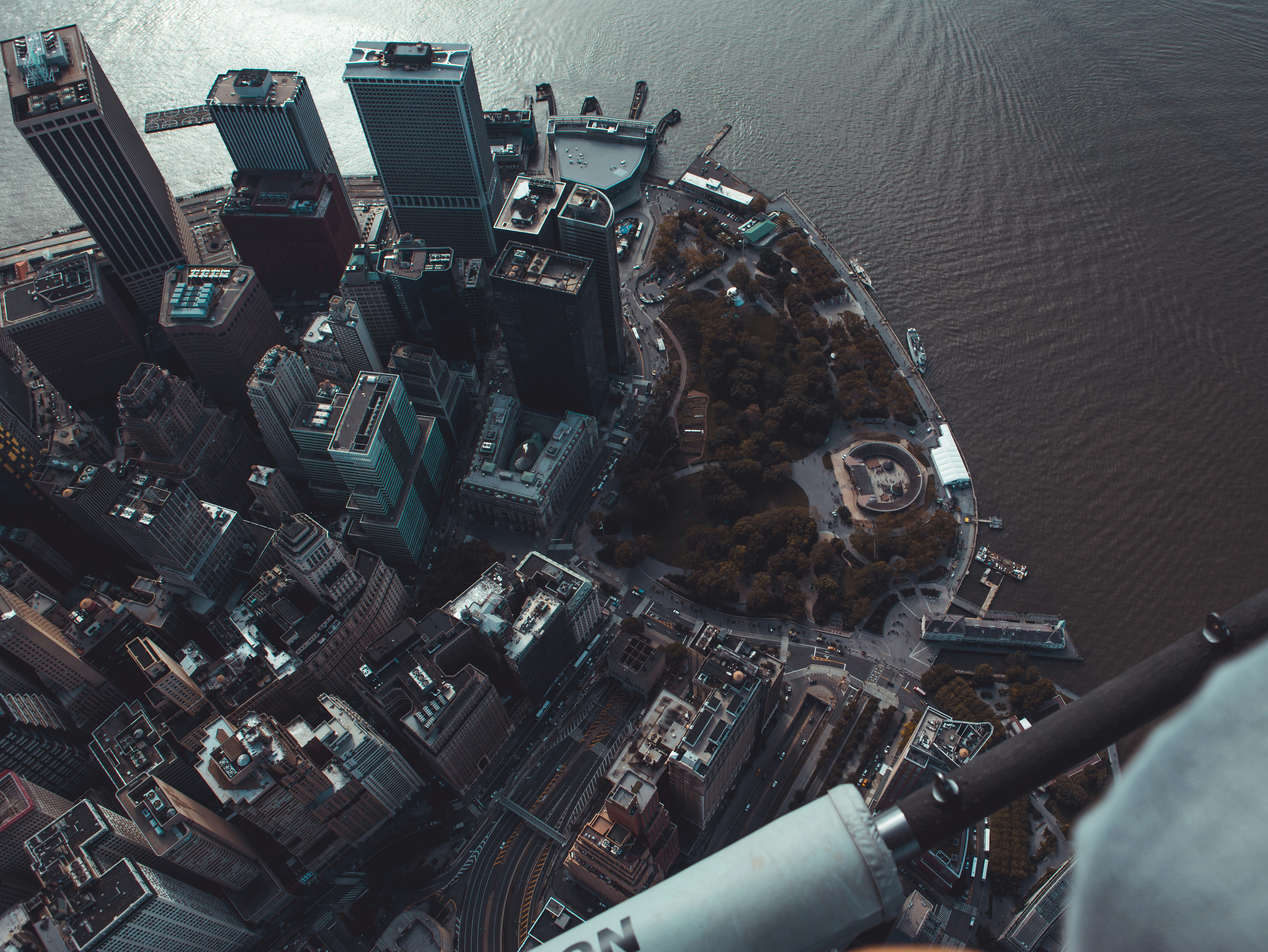 Over the City Edge: Skyscraper Alley Framing a Circular Riverside Park