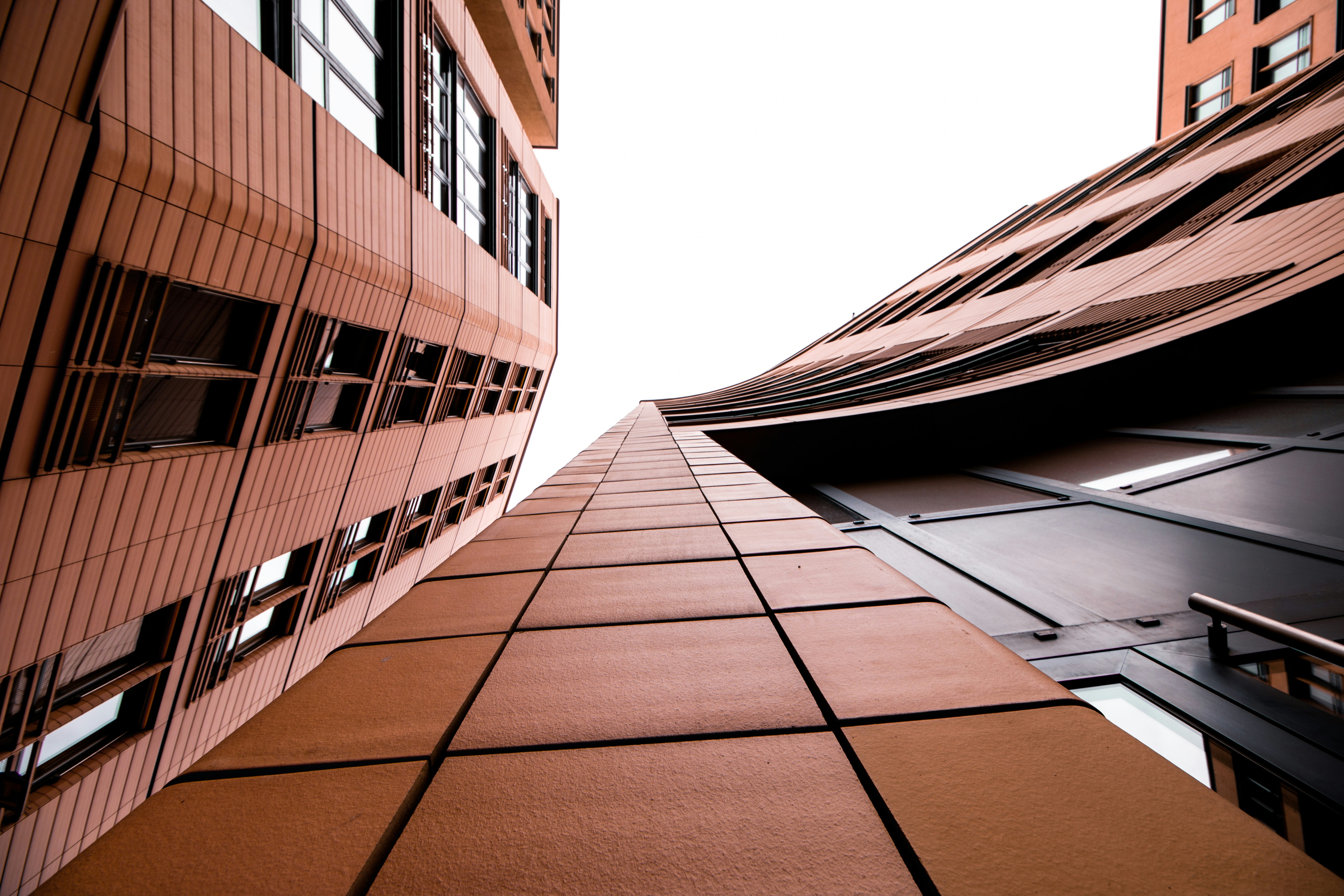Low-angle photography of brow building photo – Free Berlin Image on ...